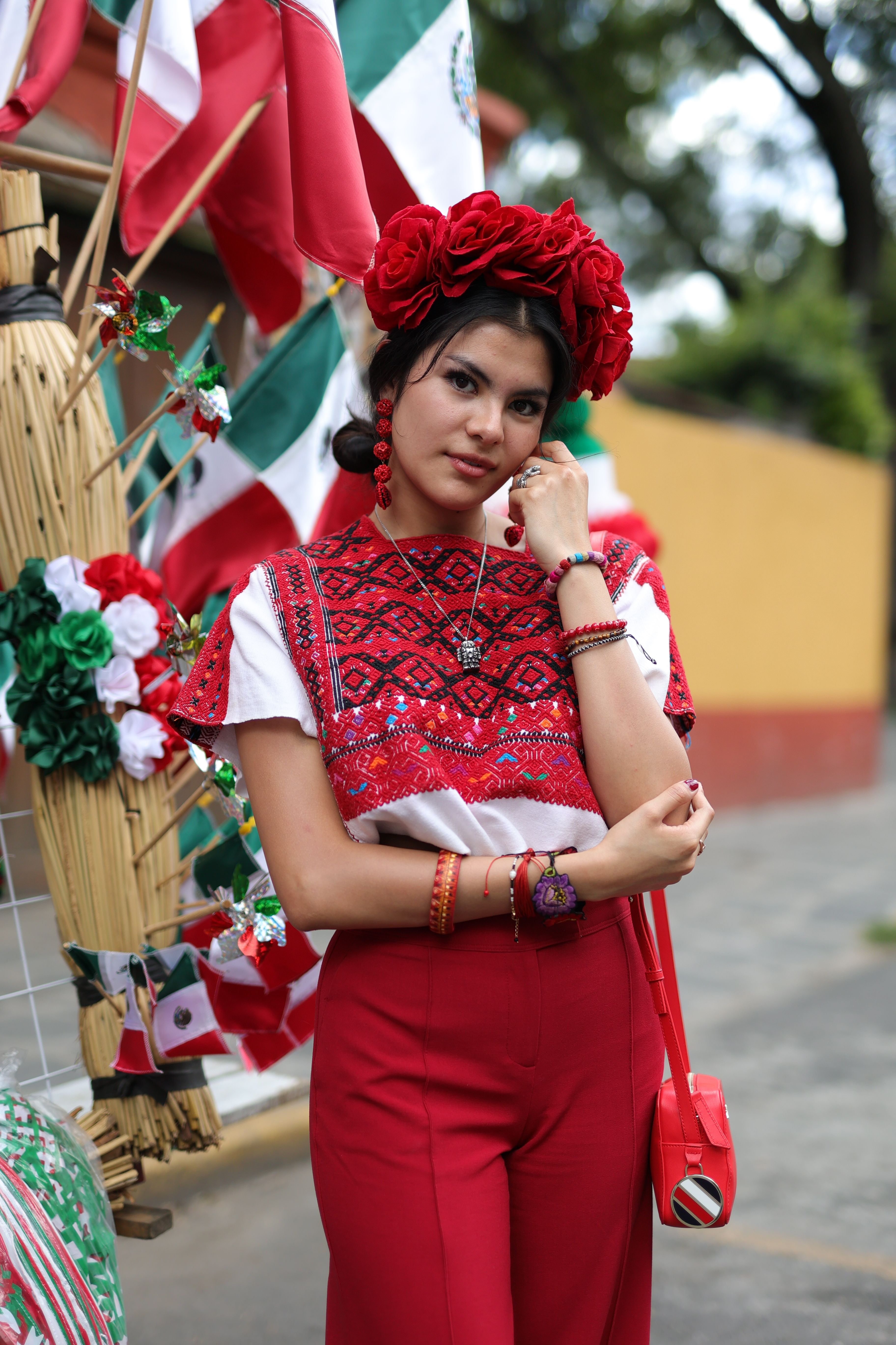 A woman in red pants and a mexican flag · Free Stock Photo