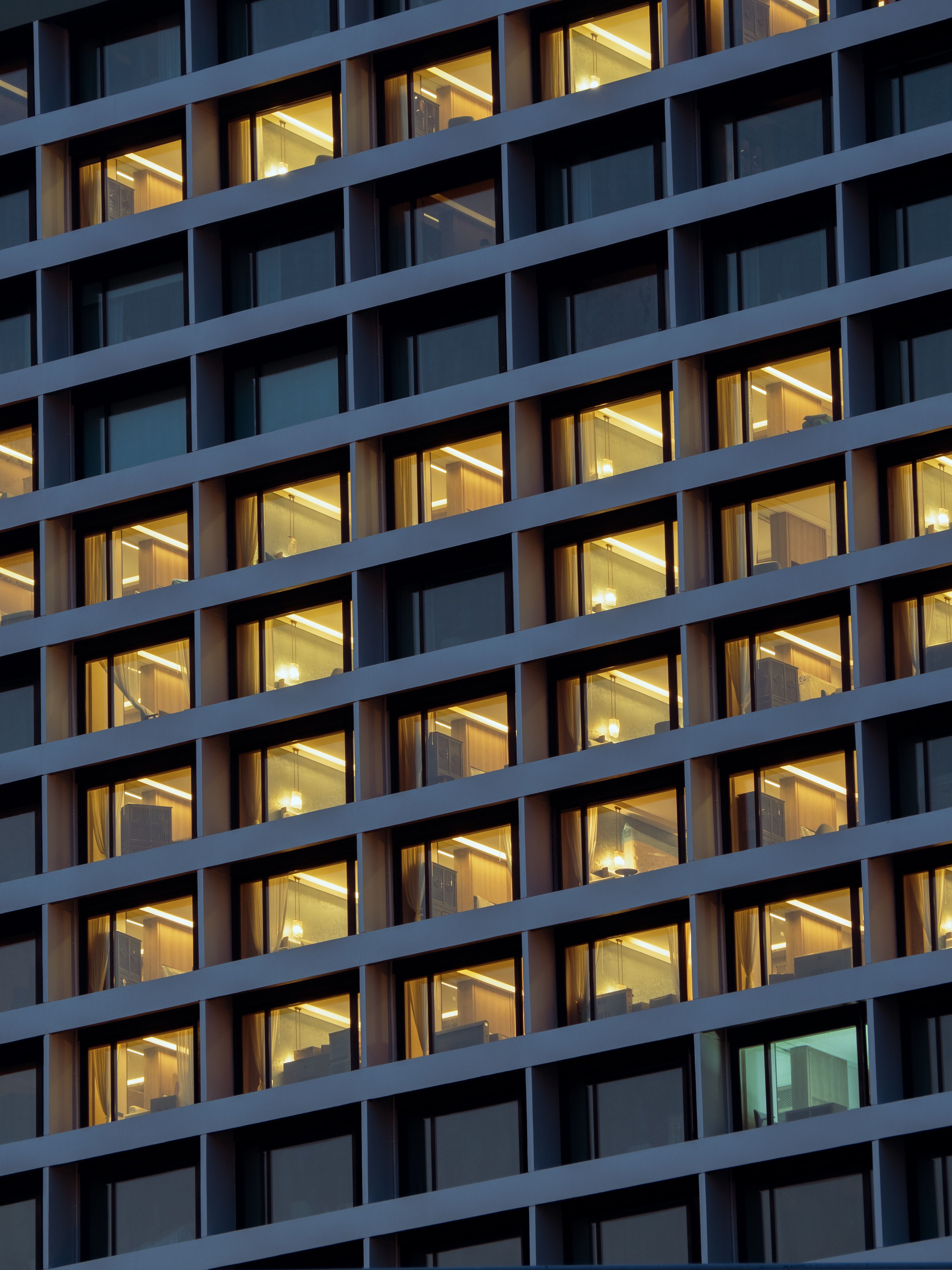 Lights in Office Building Windows · Free Stock Photo