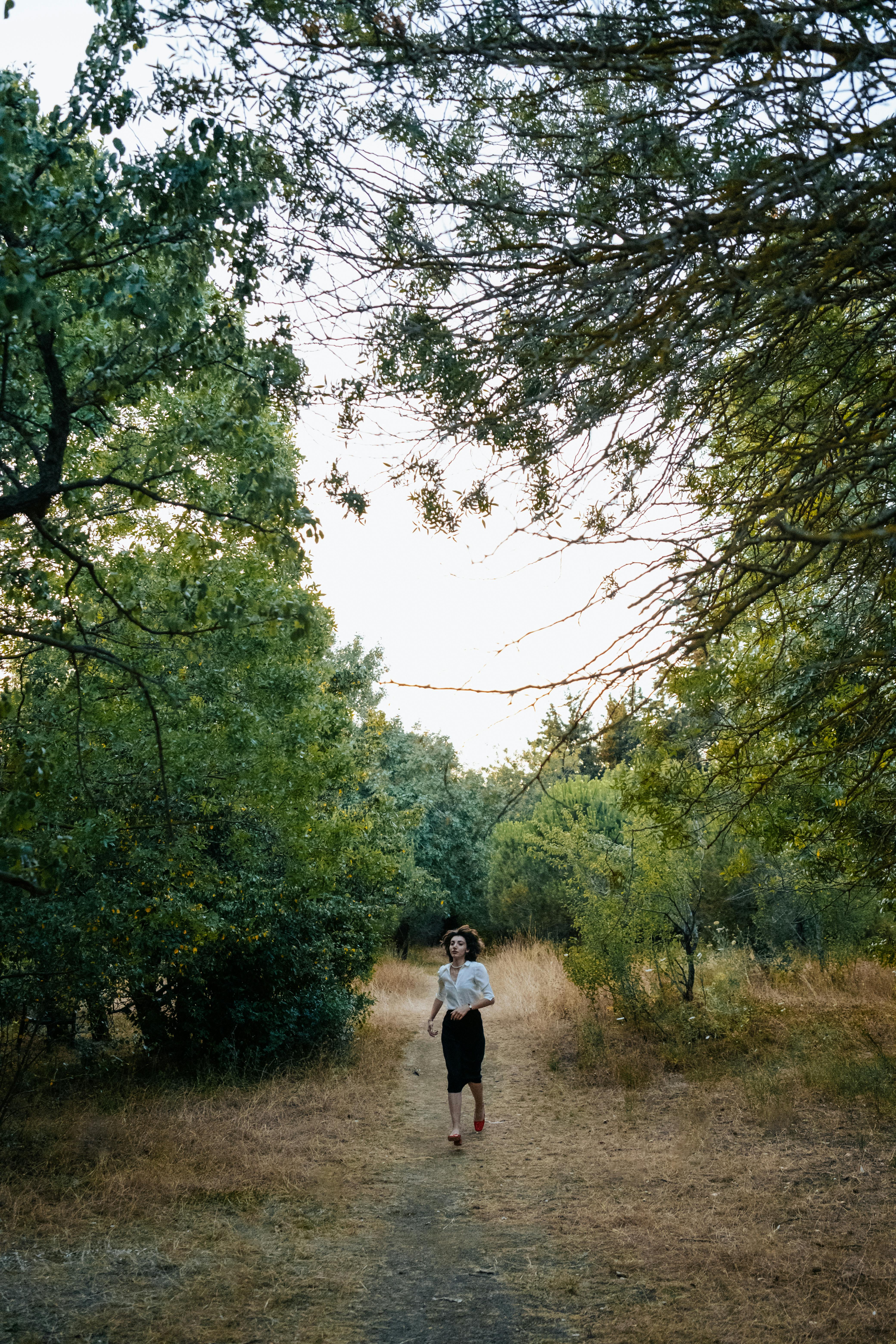 Woman Running in Countryside · Free Stock Photo