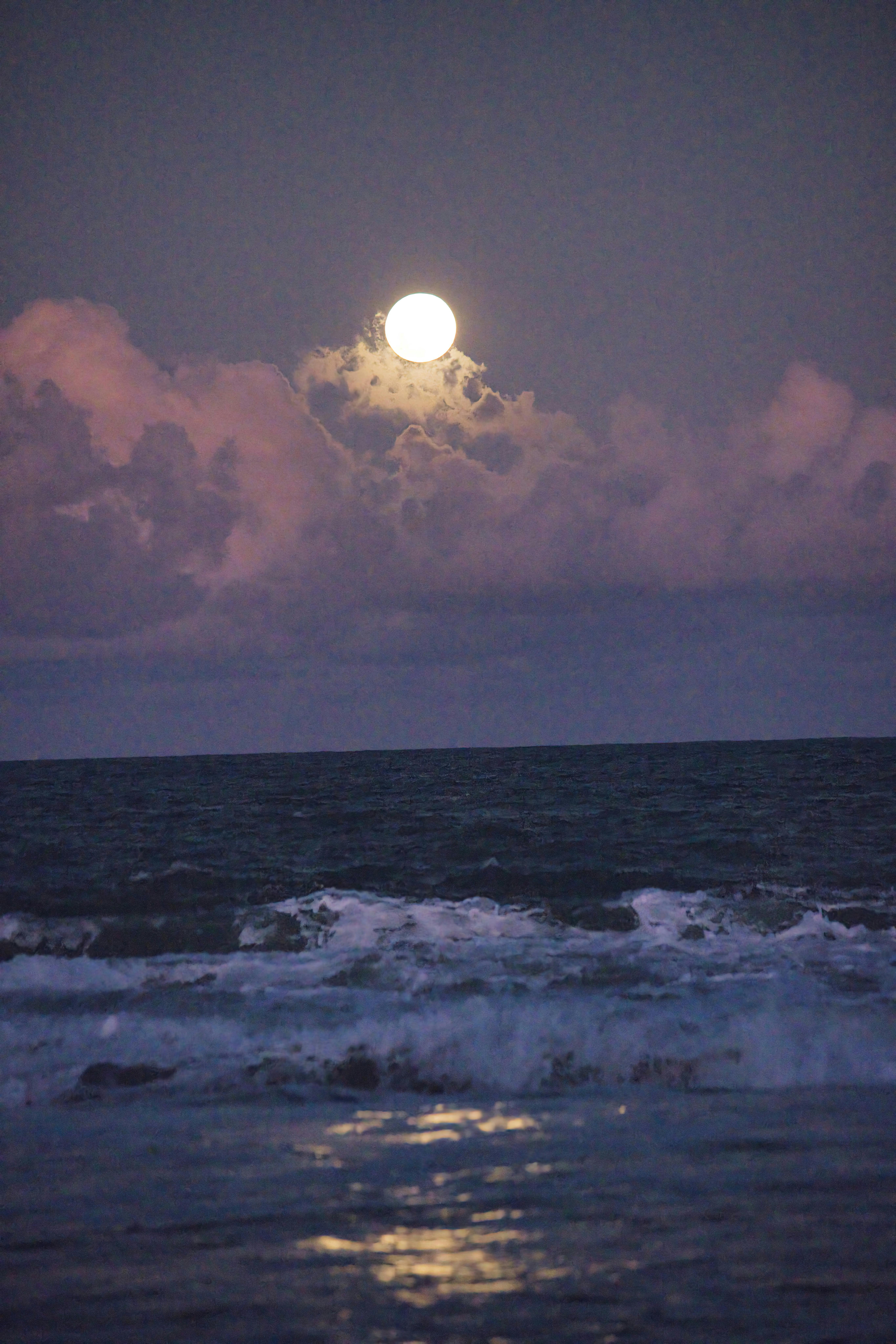 Evening Seascape with Full Moon Rising above the Clouds · Free Stock Photo