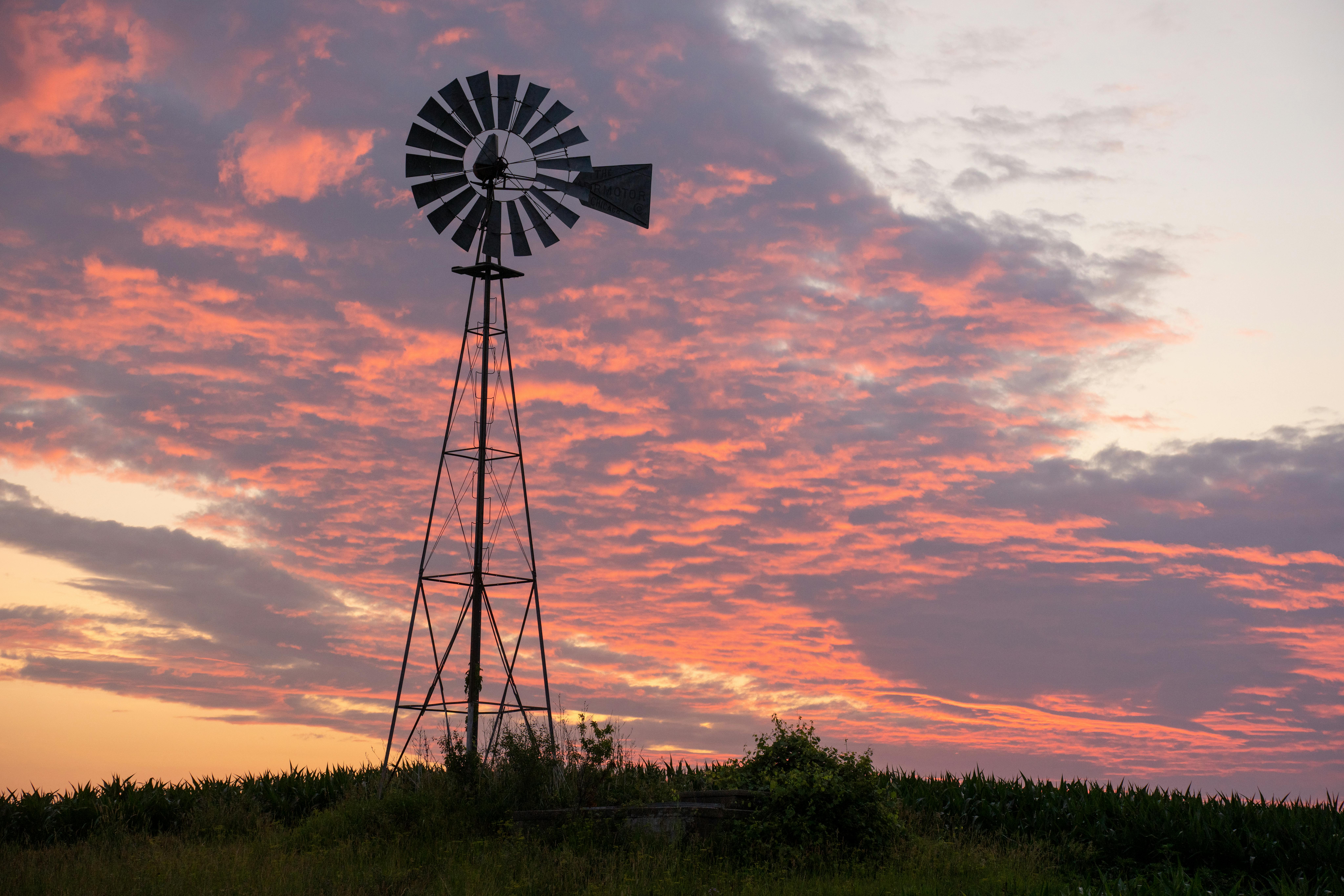 Windmill against Purple Sunset Clouds · Free Stock Photo
