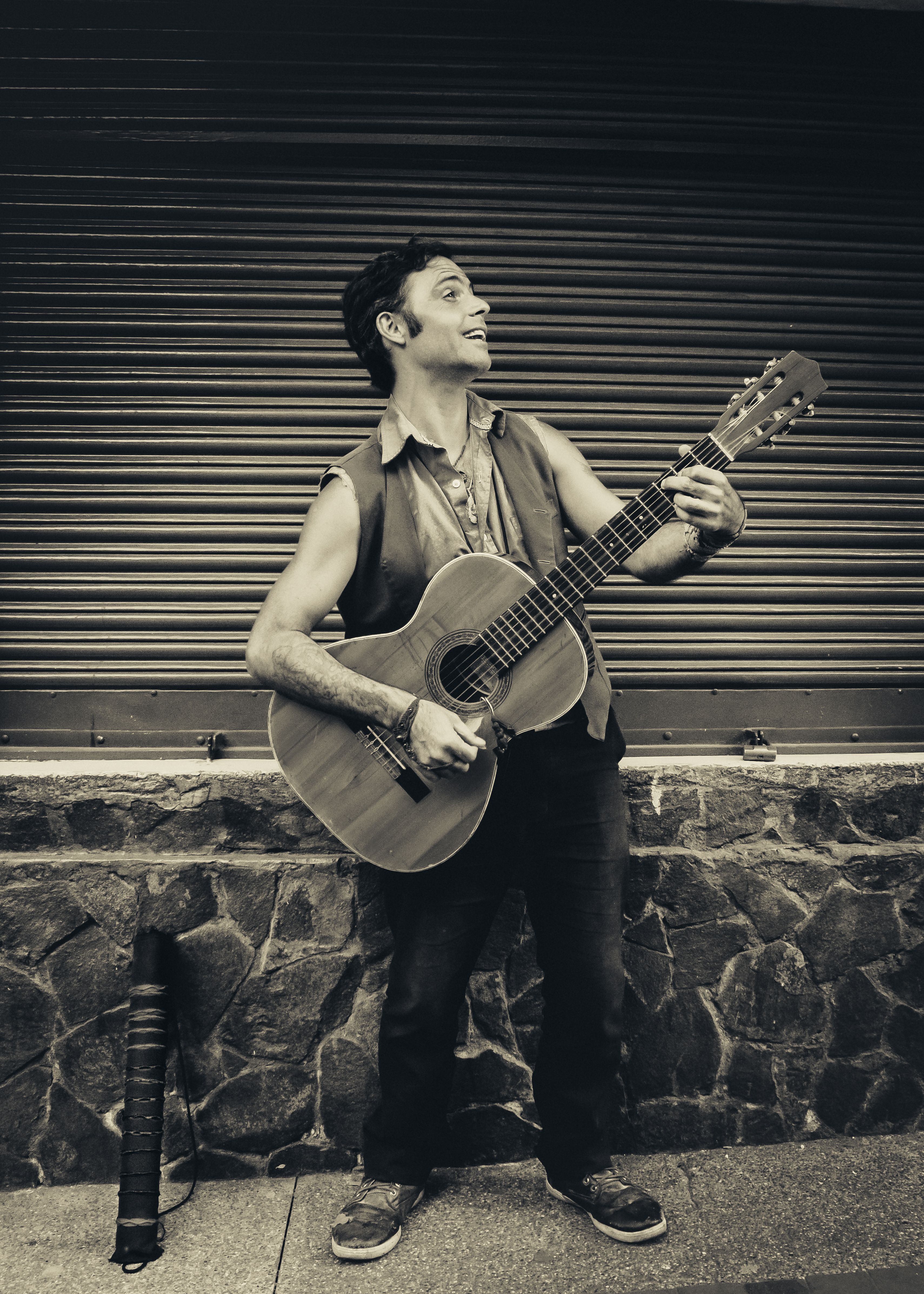 Monochrome Portrait of a Street Musician with Acoustic Guitar · Free ...