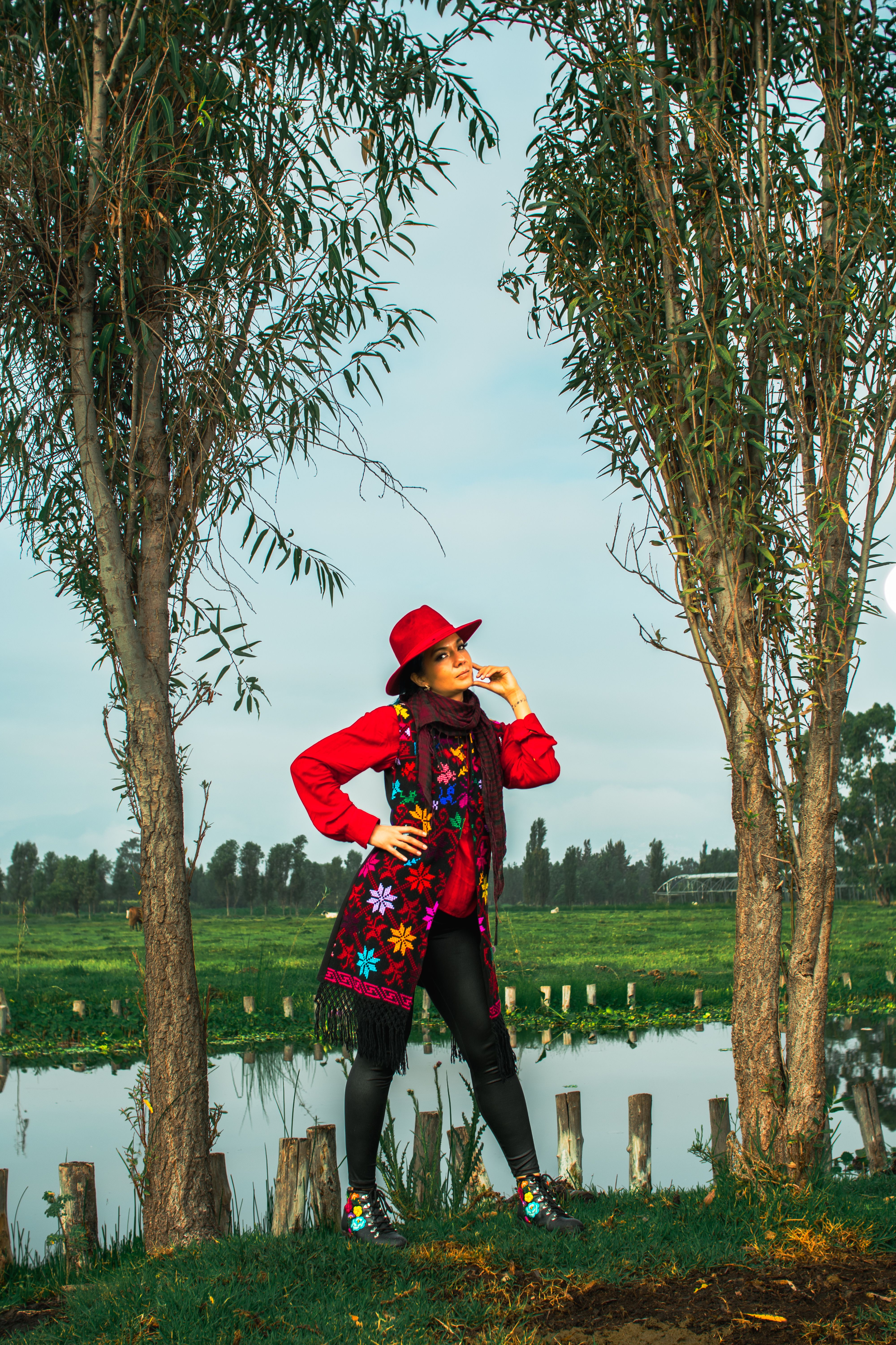 Fashion Model posing in Red Hat · Free Stock Photo