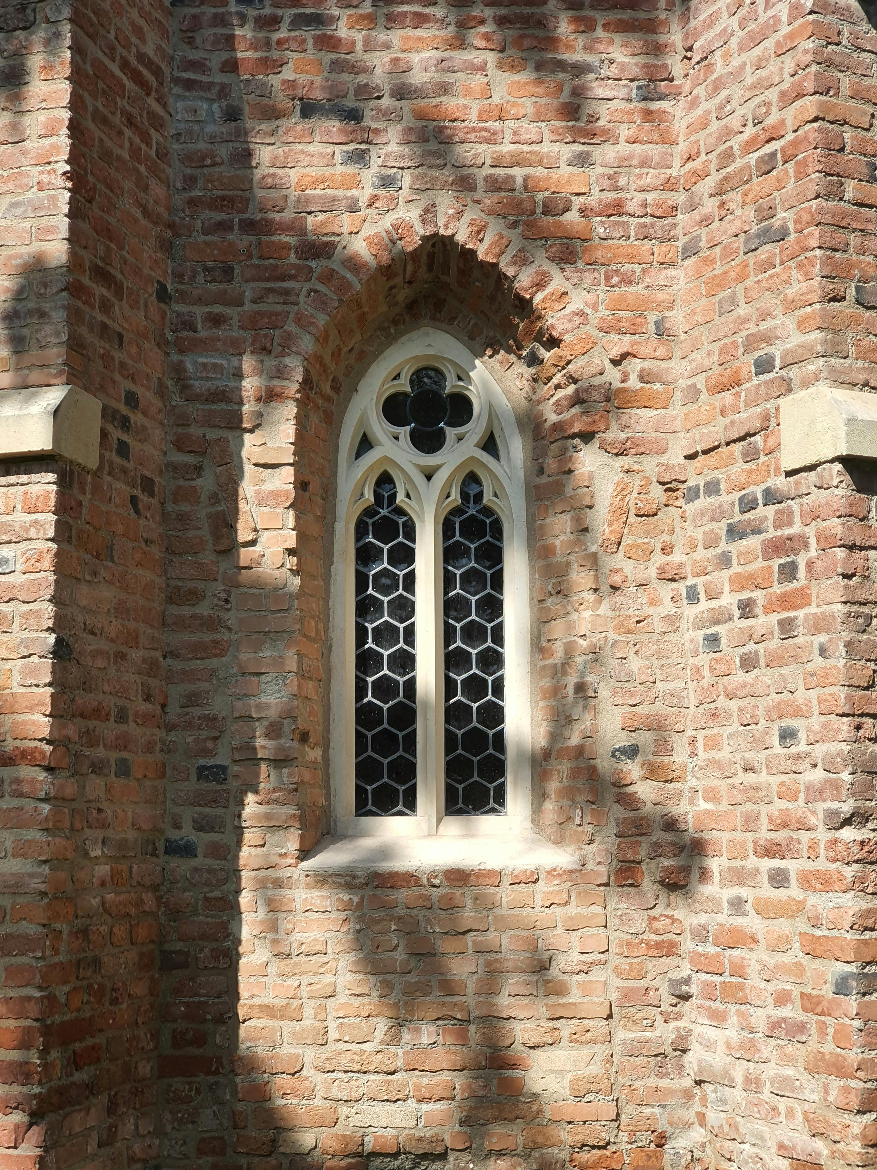 Bricks around Vintage Church Window · Free Stock Photo