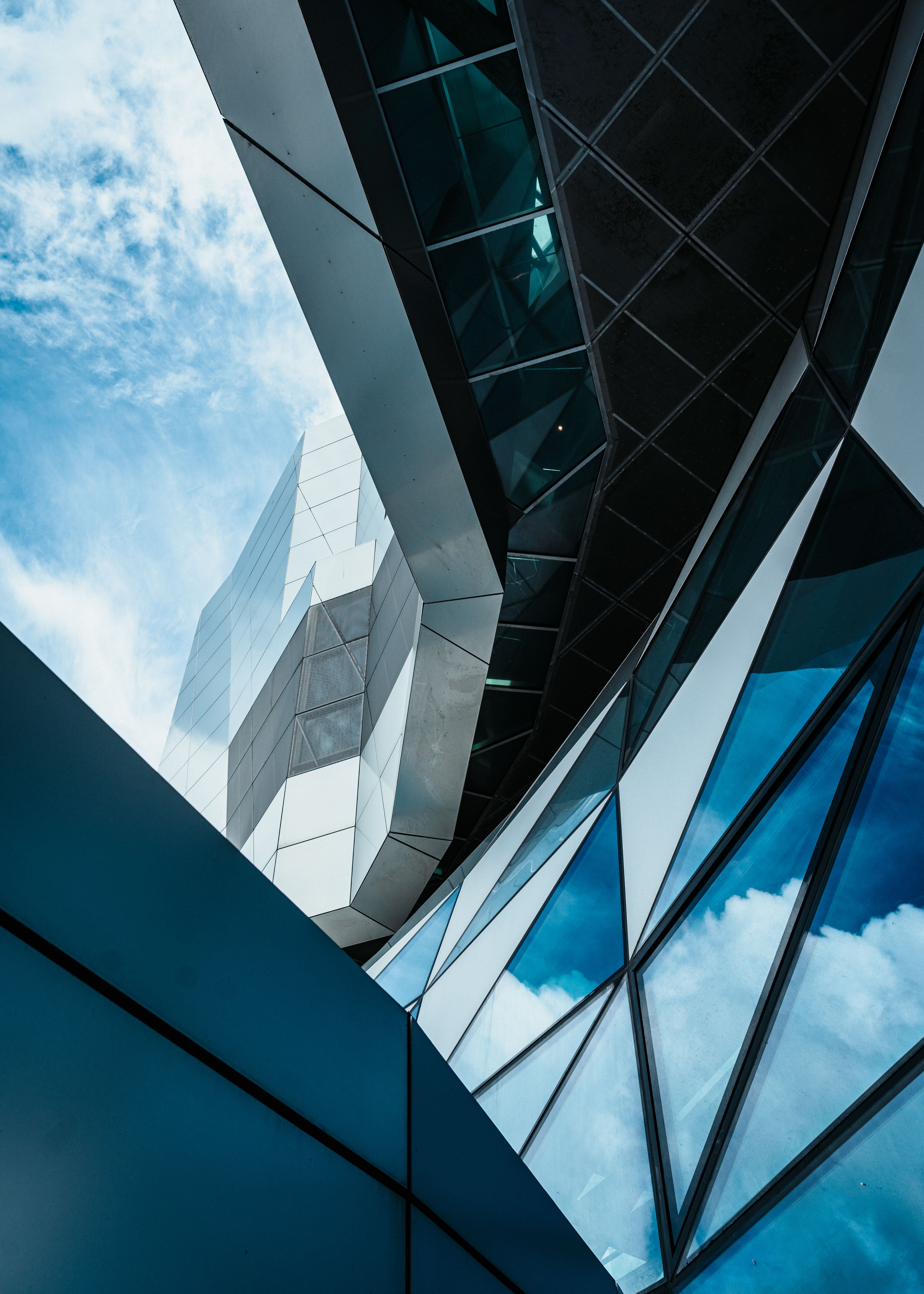 Sunlight over Glass Building Wall · Free Stock Photo