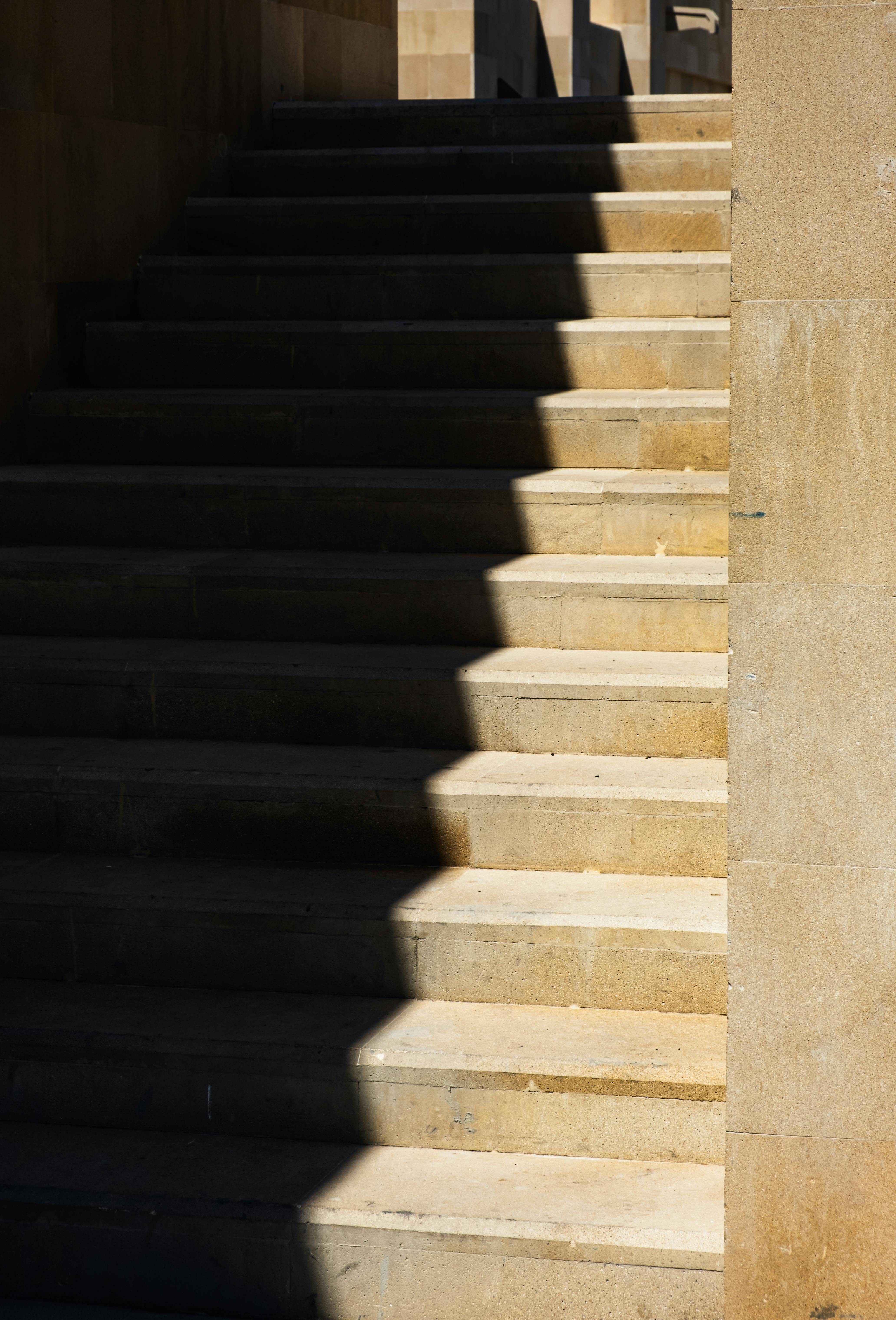 Shadow on Sunlit Stairs · Free Stock Photo