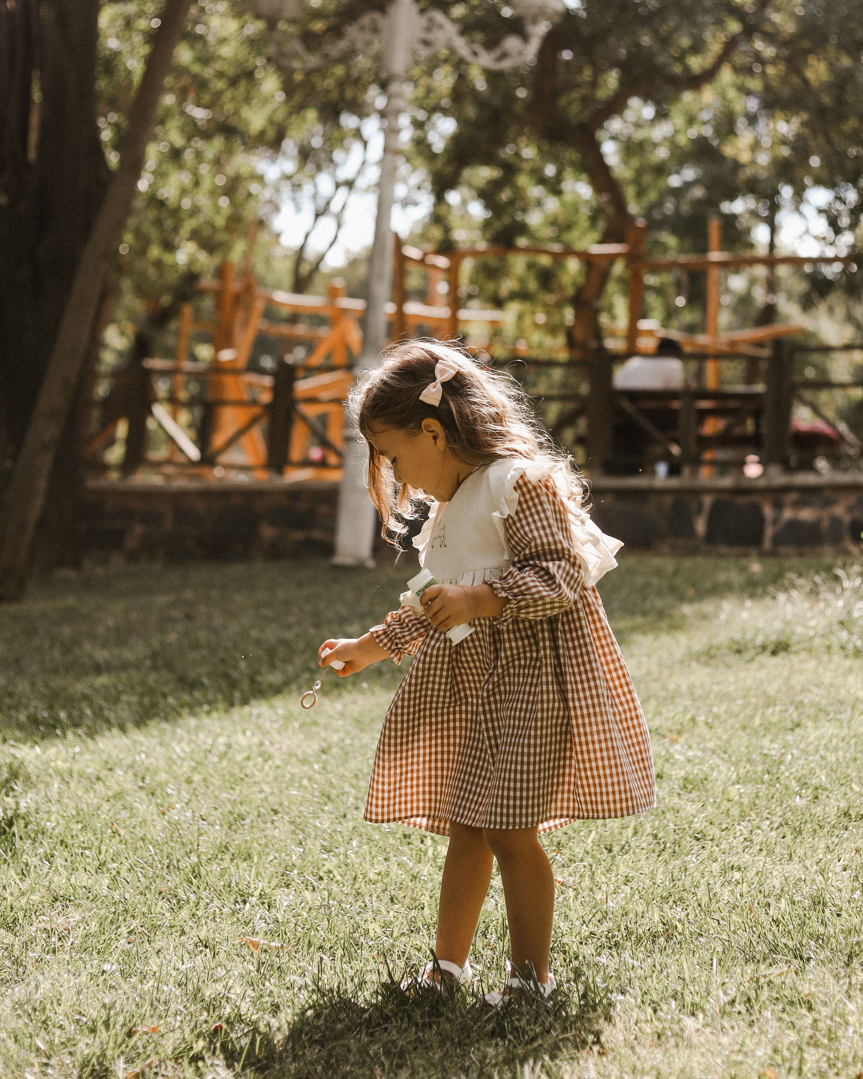 Girl Touching Bush · Free Stock Photo