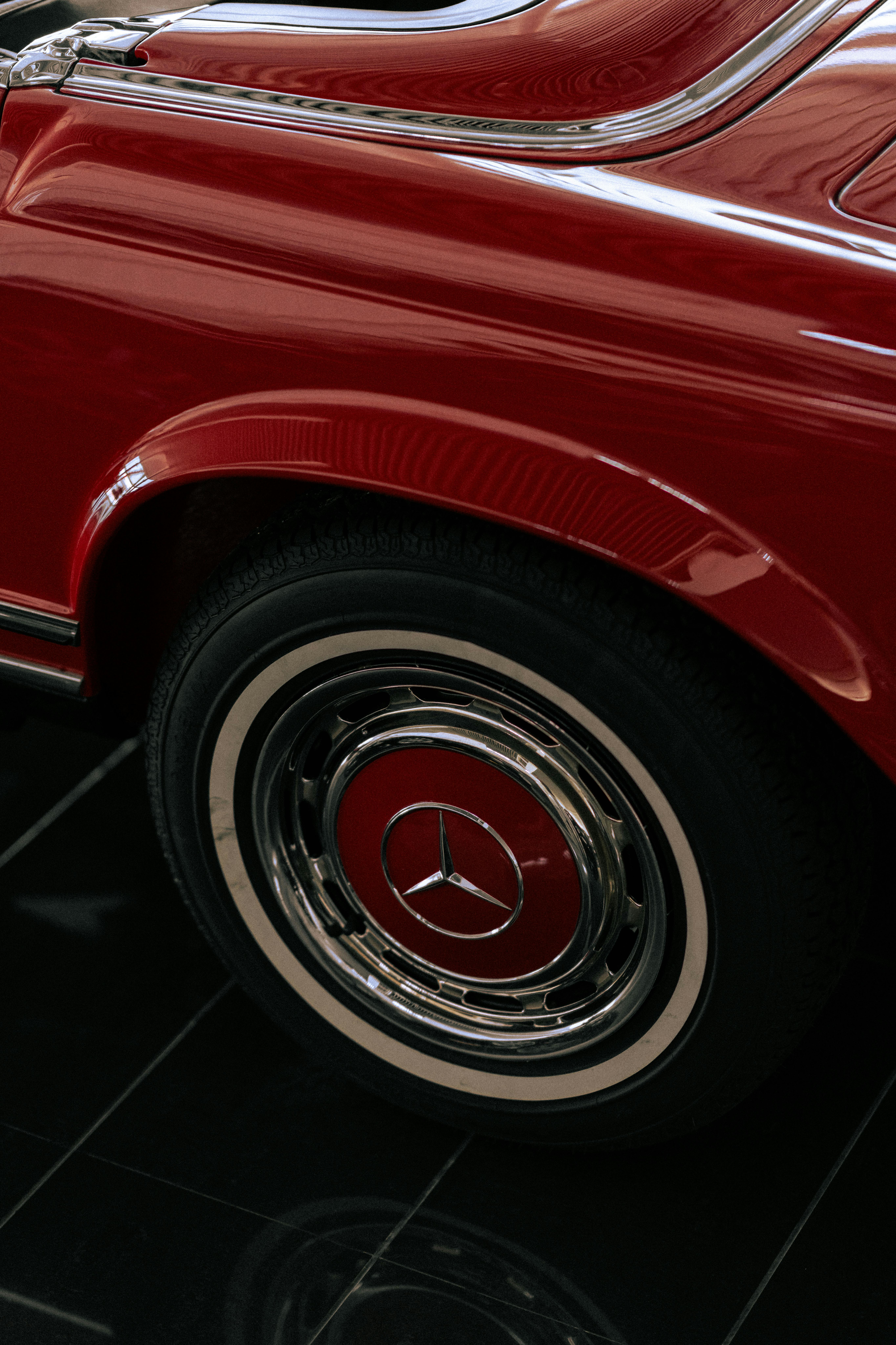 A red mercedes benz car with a black rim · Free Stock Photo