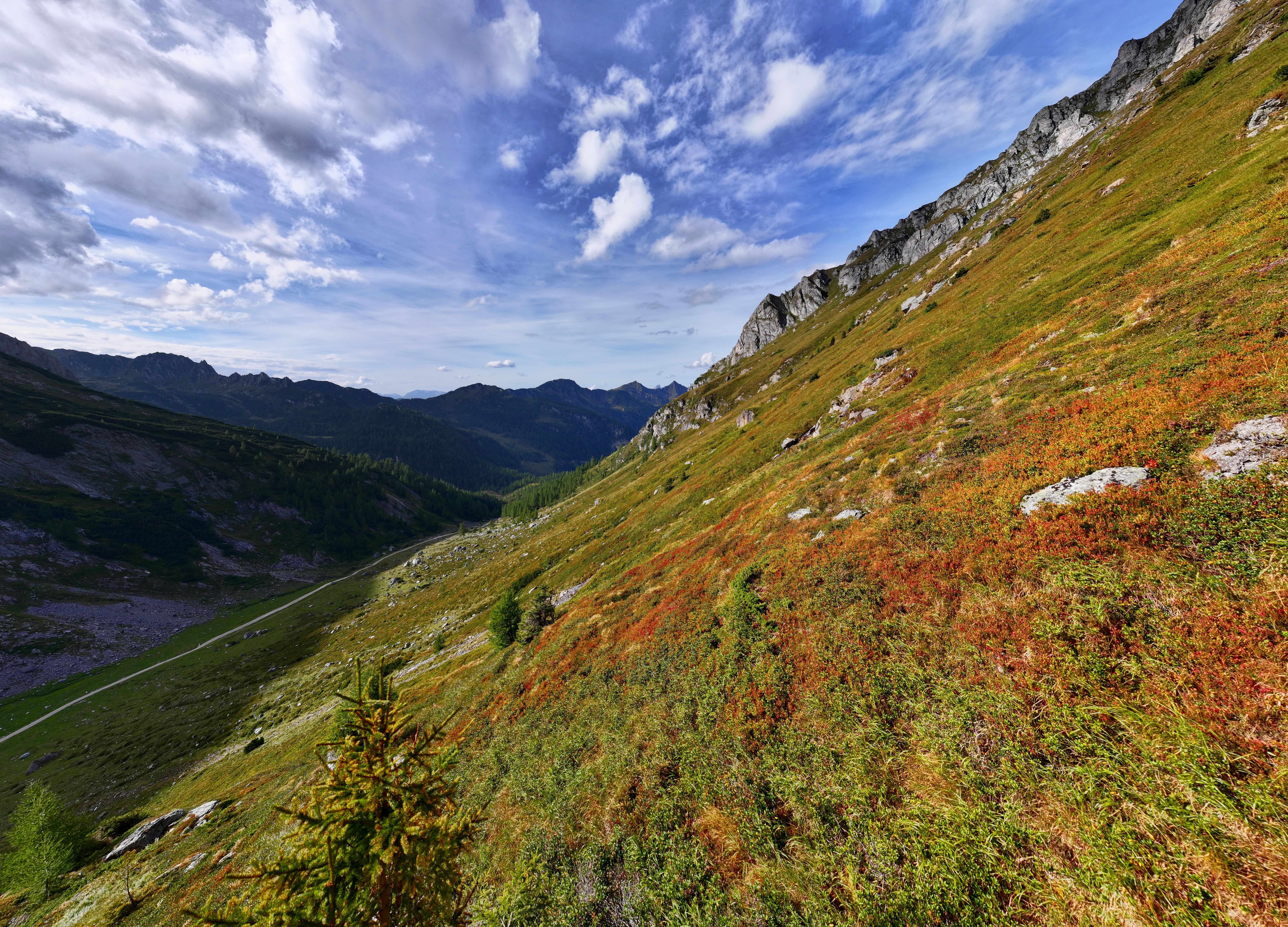 Panorama of a Narrow Valley Between Mountain Slopes · Free Stock Photo