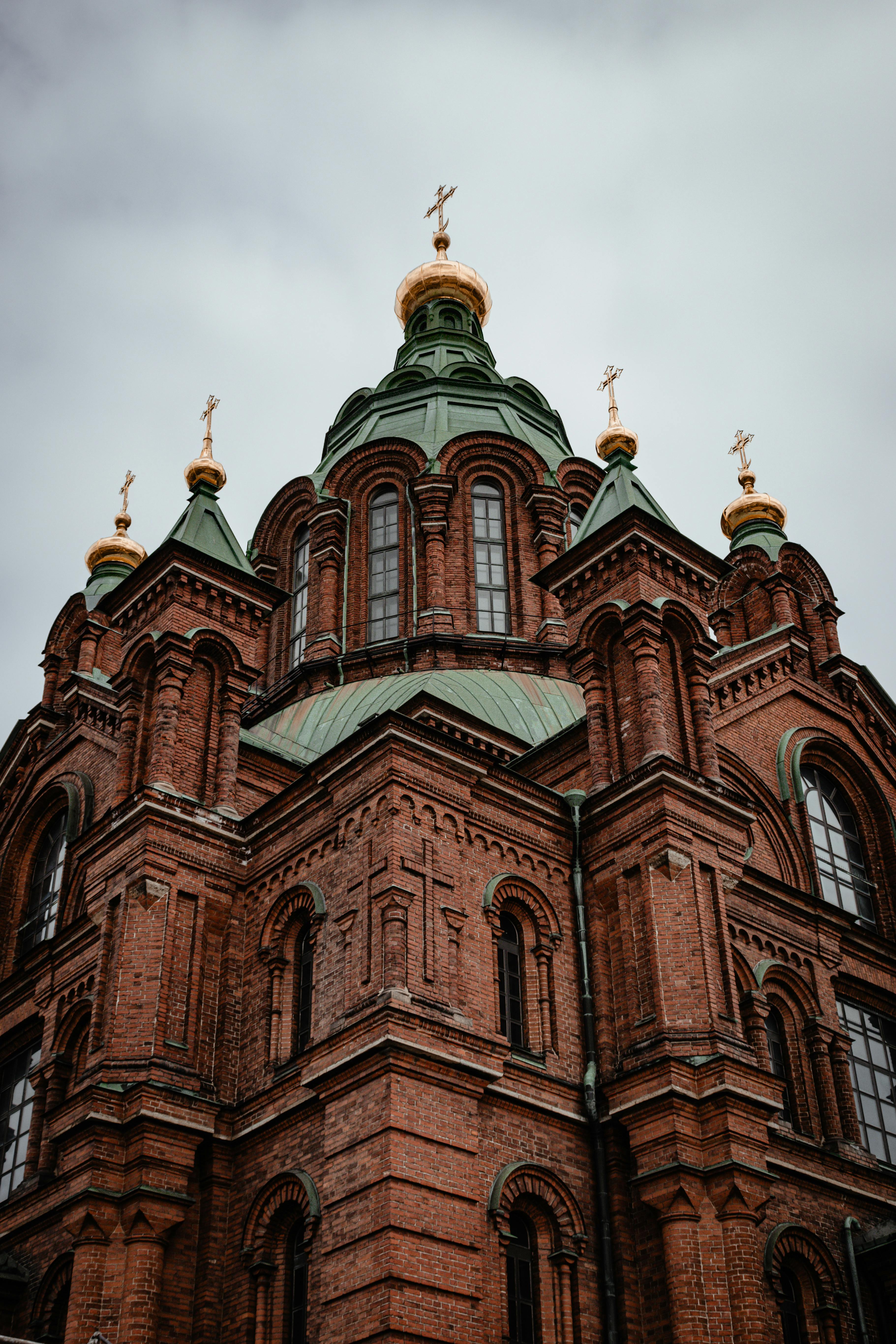 Photo of Cathedral Near Buildings and River · Free Stock Photo