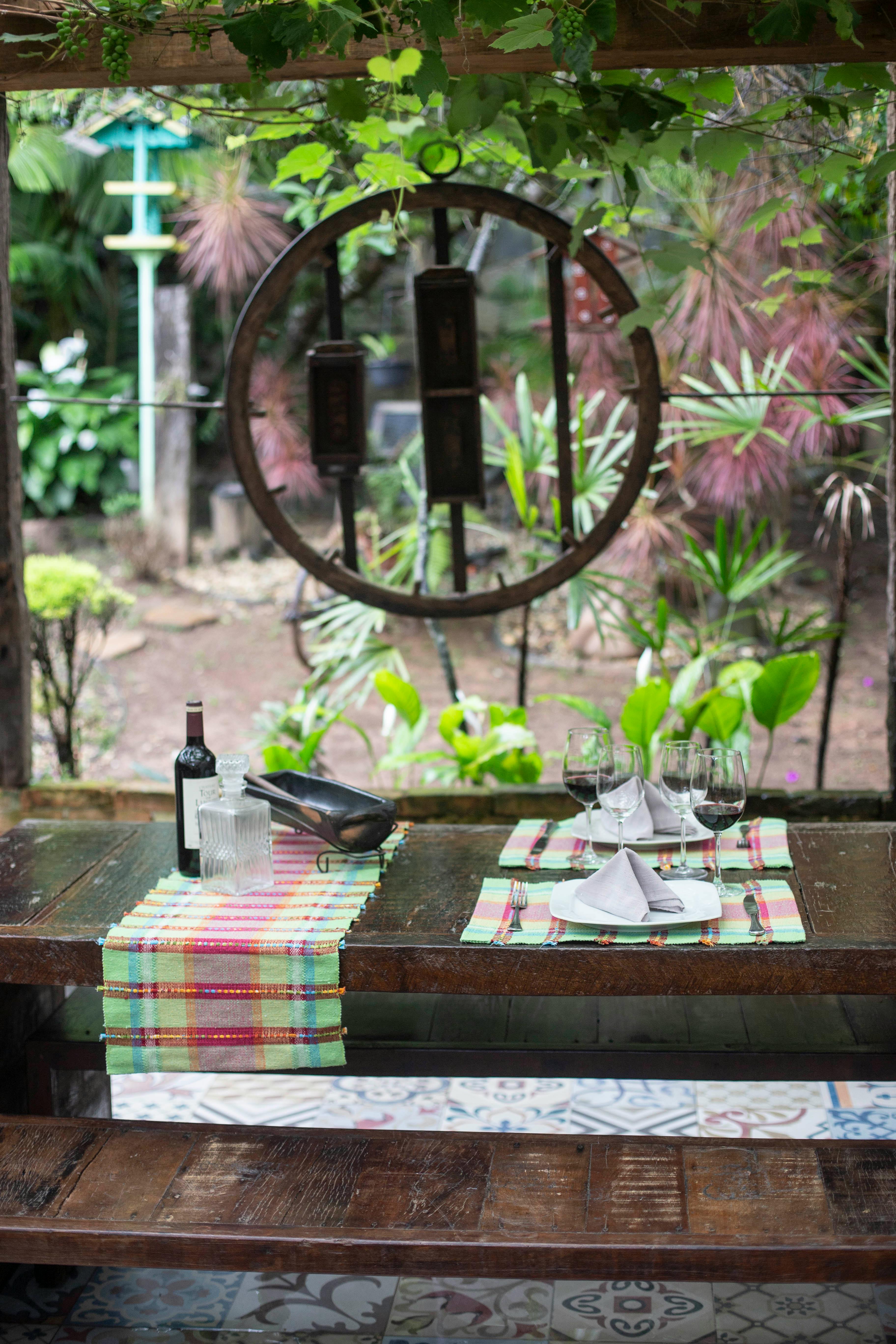 High Angle Photography of Dinner Set on Table Surrounded With Padded ...