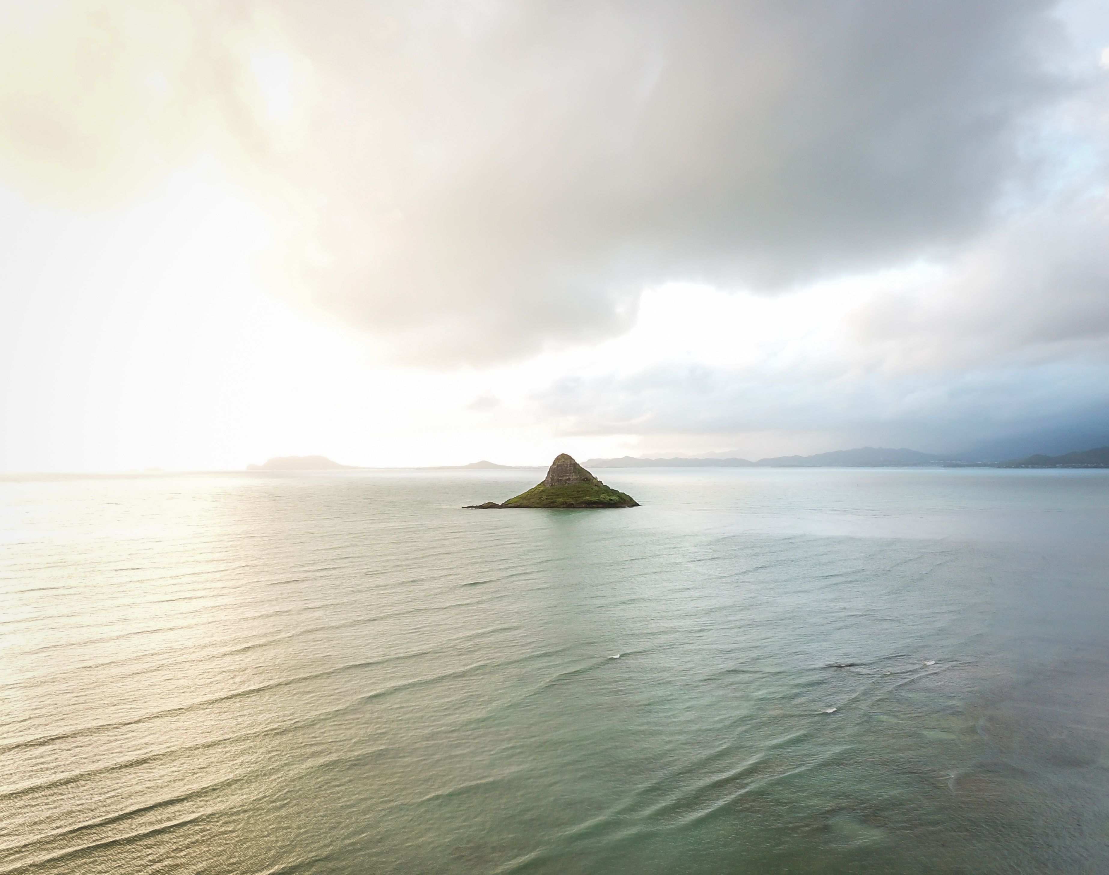 Overcast over Small Island on Sea Coast at Sunset · Free Stock Photo