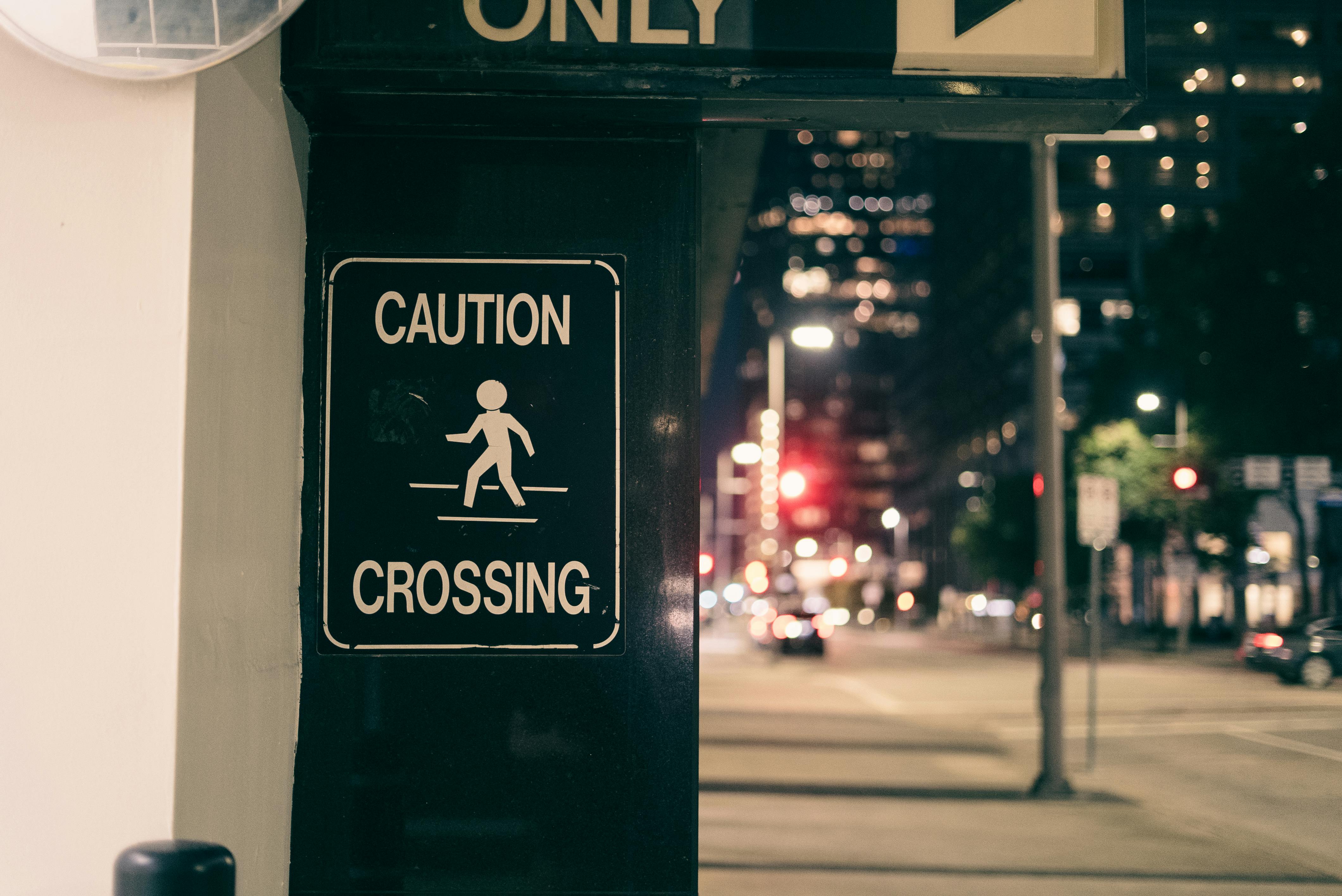 Pedestrian Crossing Sign on a Night City Street · Free Stock Photo