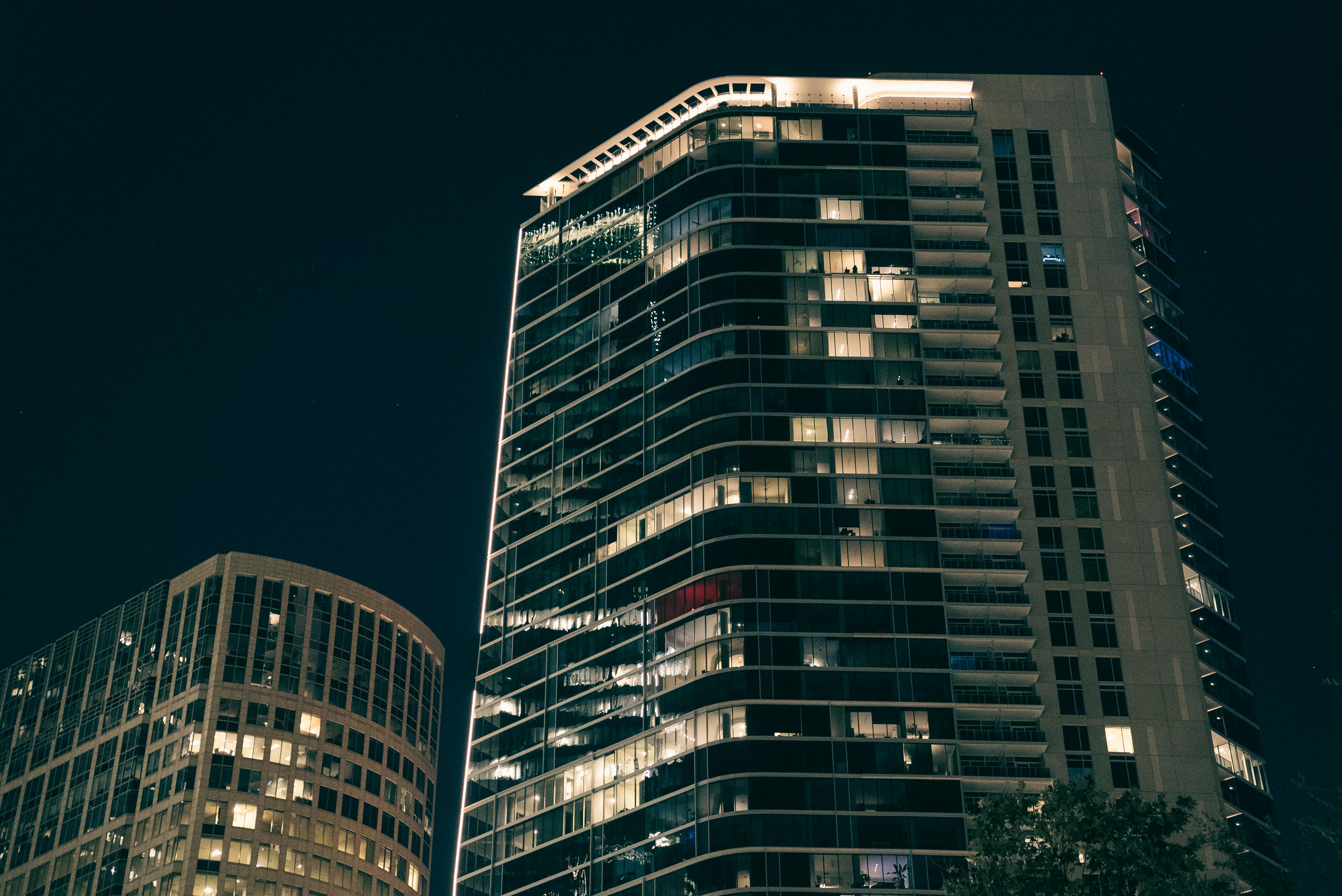 High Rise Buildings During Night Time · Free Stock Photo