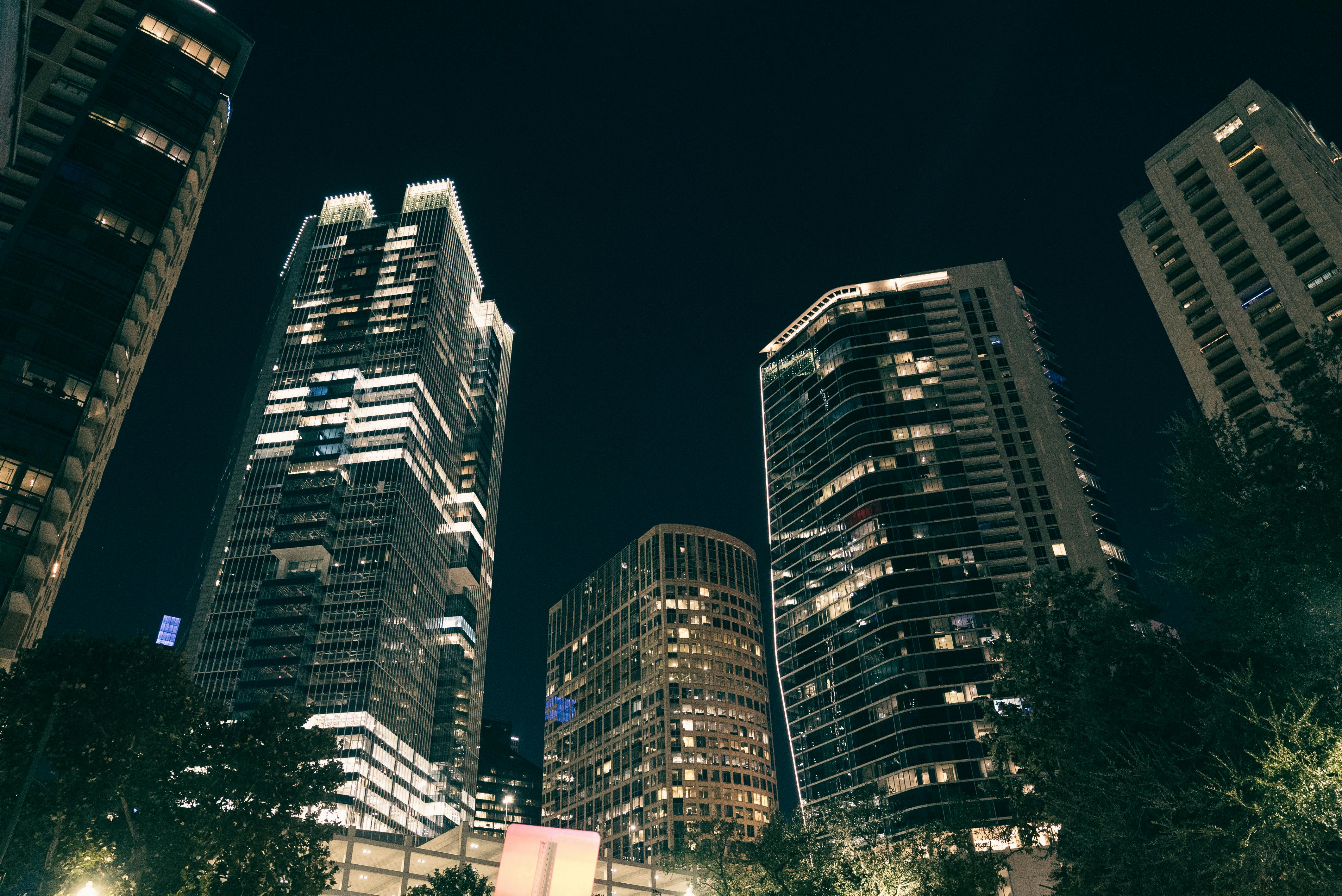 Illuminated Skyscrapers and High-Rise Buildings at Night · Free Stock Photo