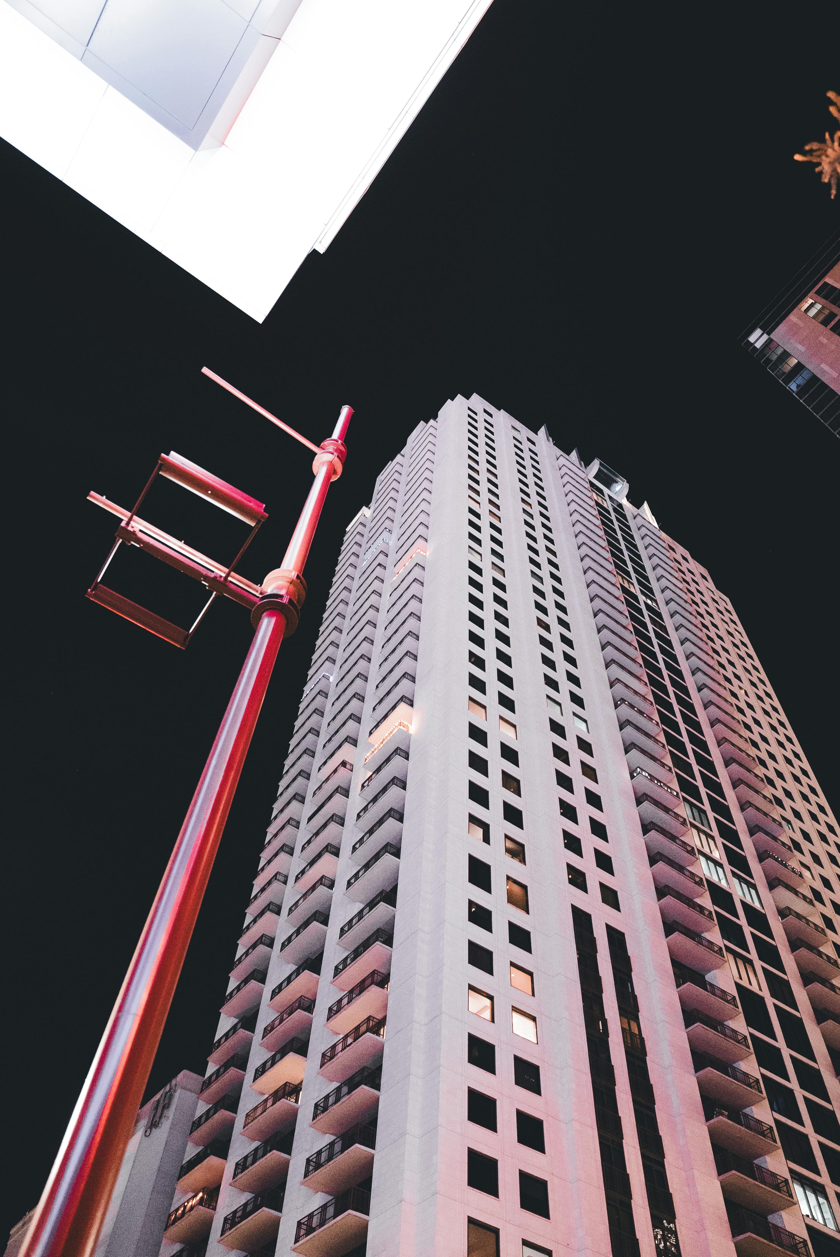 Modern Skyscraper against Night Sky · Free Stock Photo