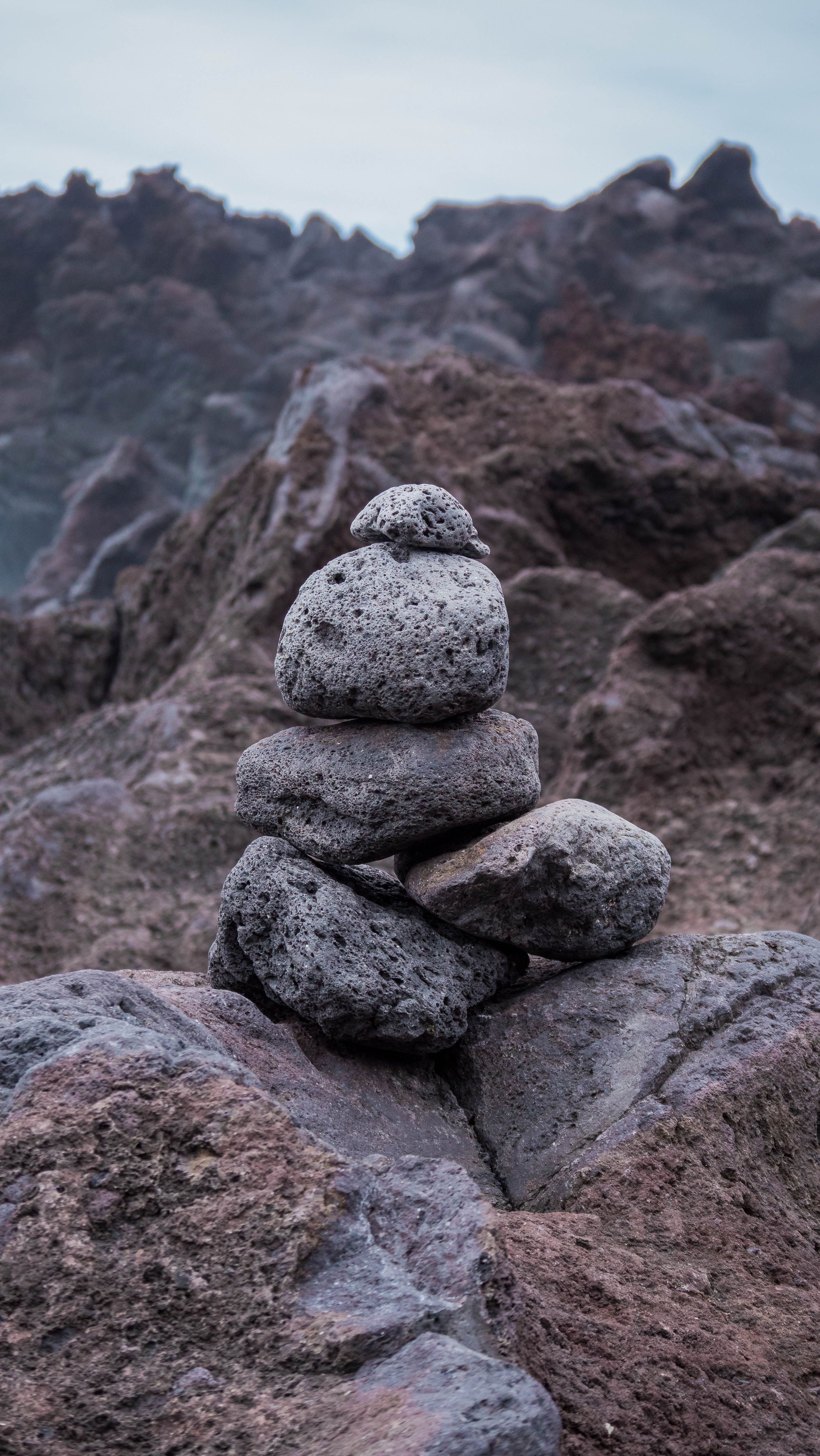 Heap of Stones among Rocks · Free Stock Photo