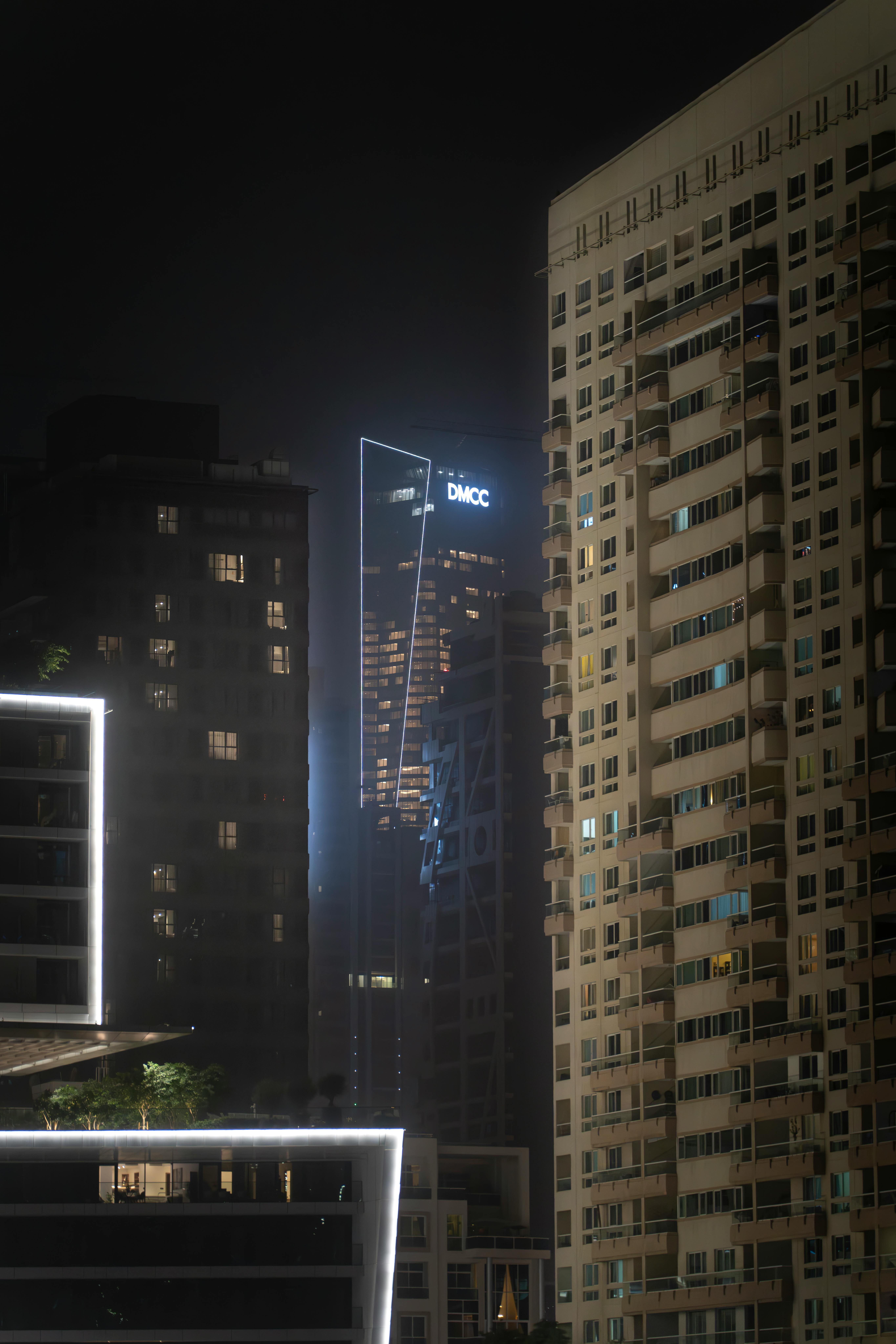 High Rise City Building during Night Time Photo · Free Stock Photo