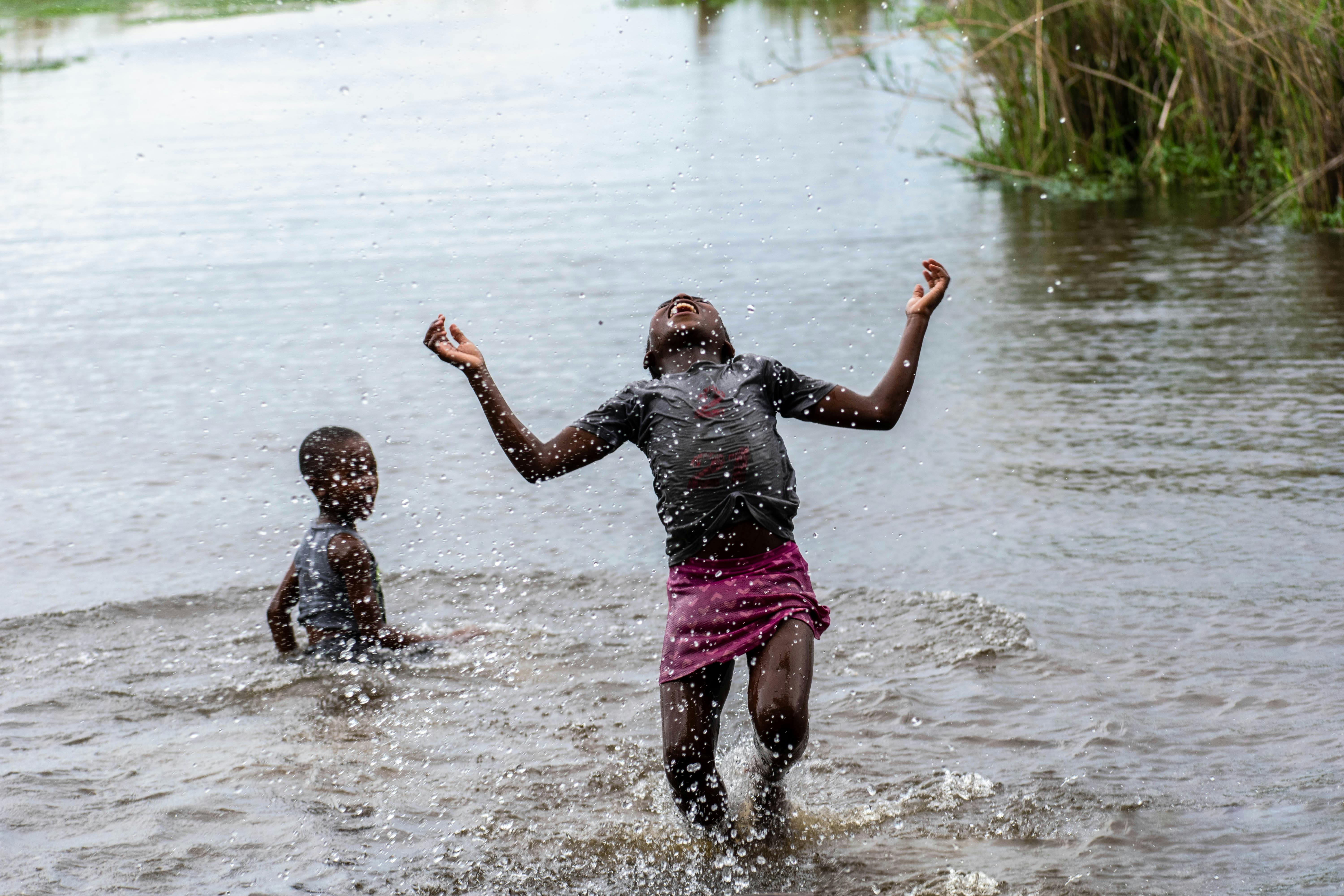 Children Playing in the River · Free Stock Photo