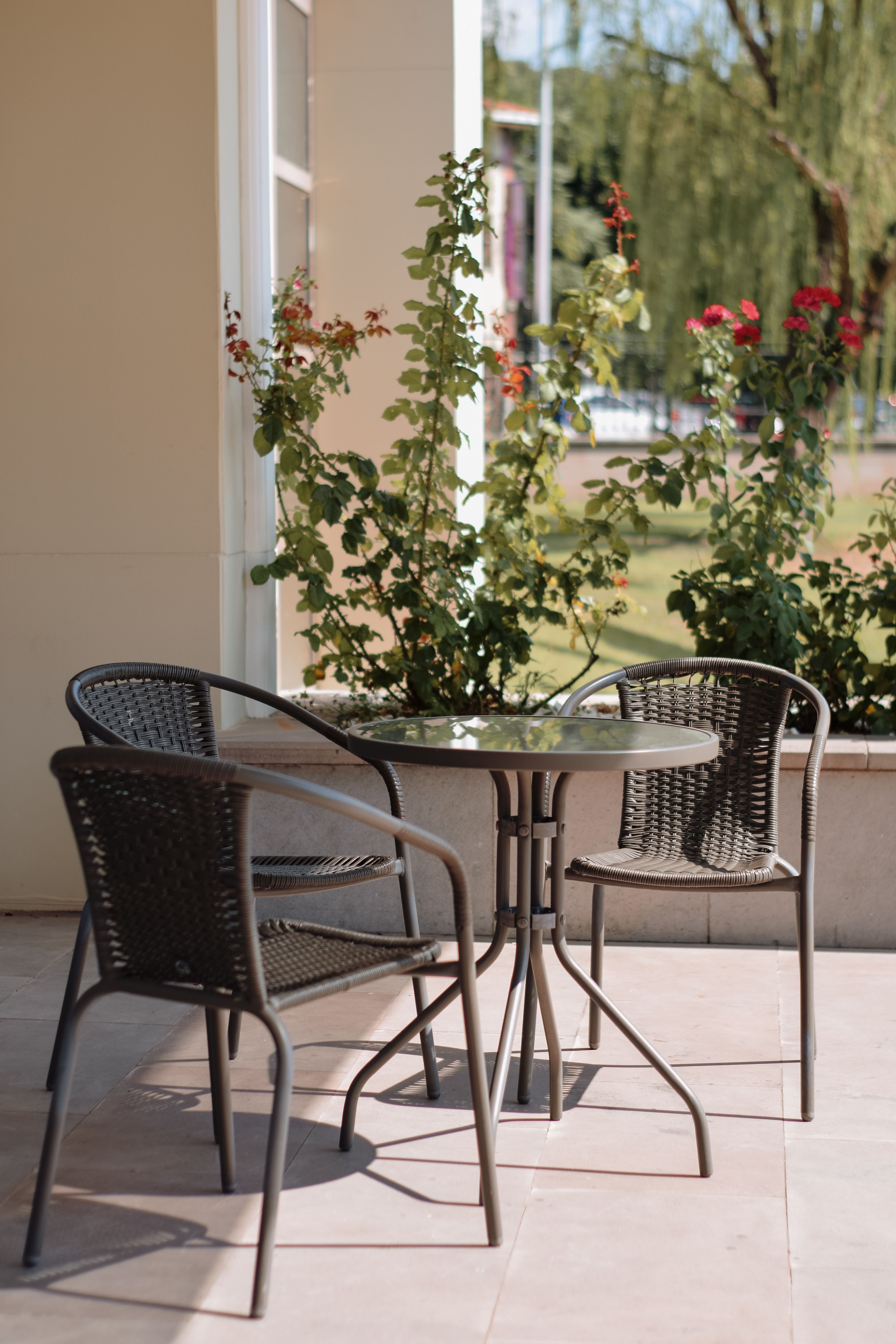 Table and Chairs on Terrace · Free Stock Photo