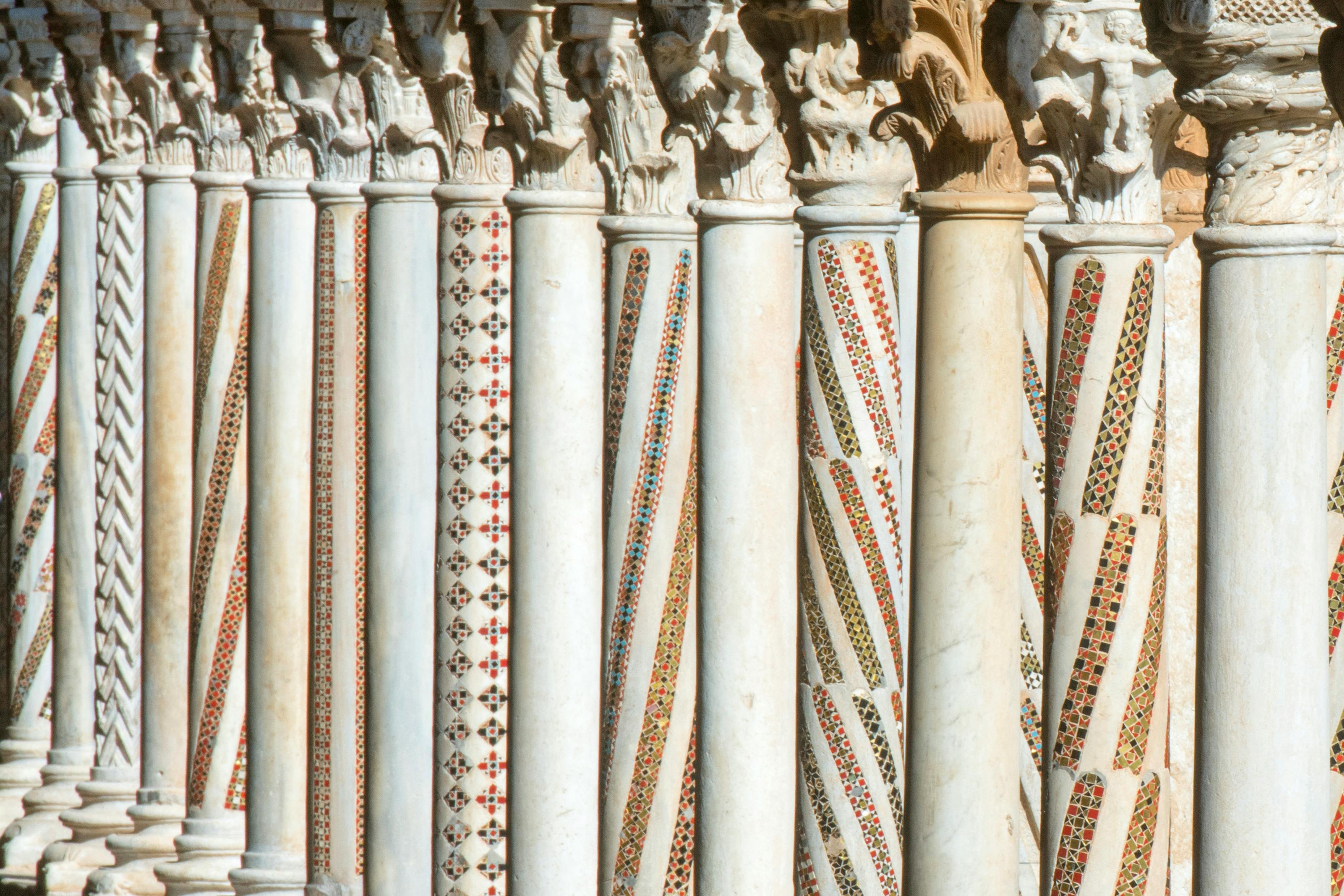 Colonnade of Vintage, Ornamented Columns · Free Stock Photo