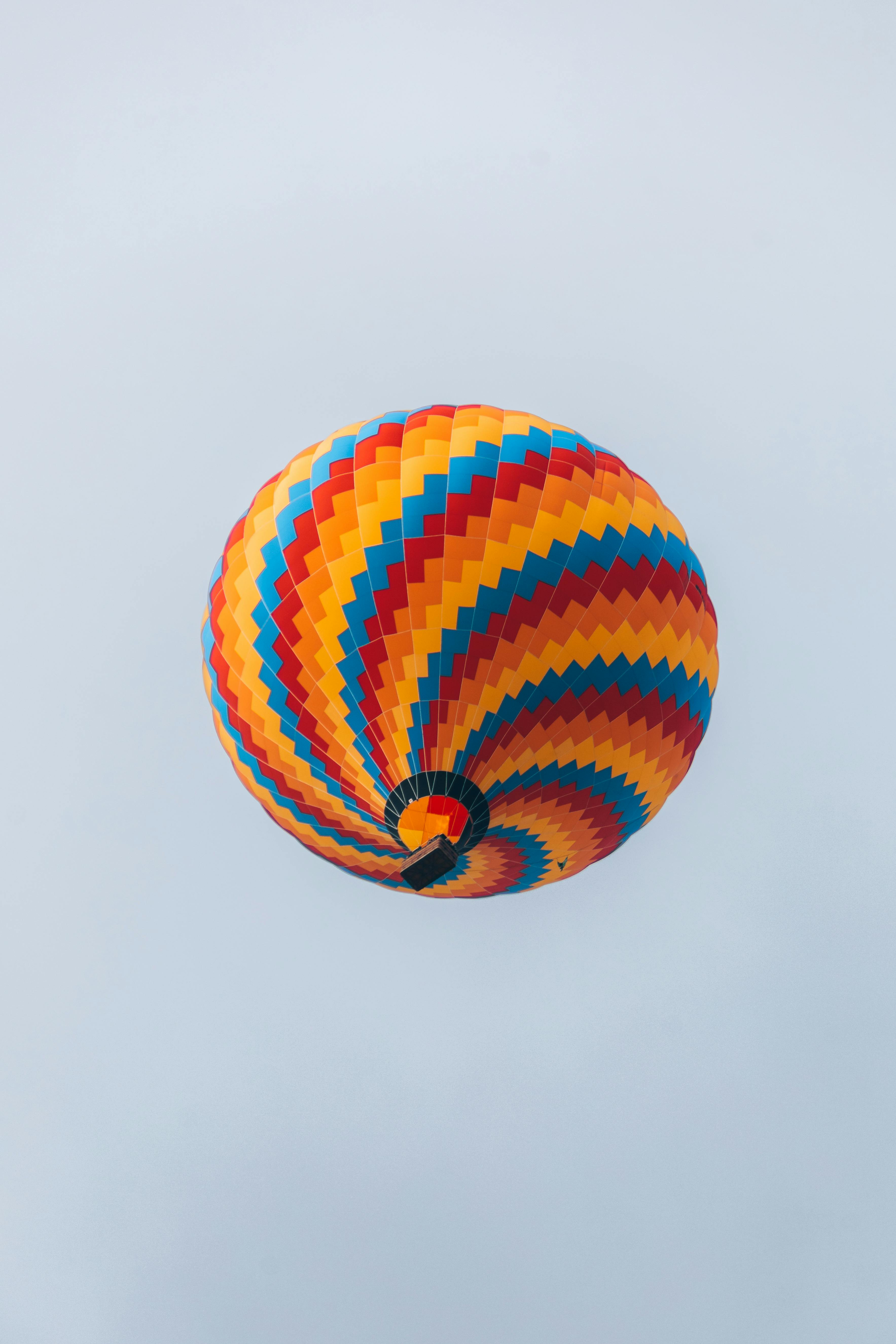 Hot Air Balloon Flying Under Blue Sky during Daytime · Free Stock Photo