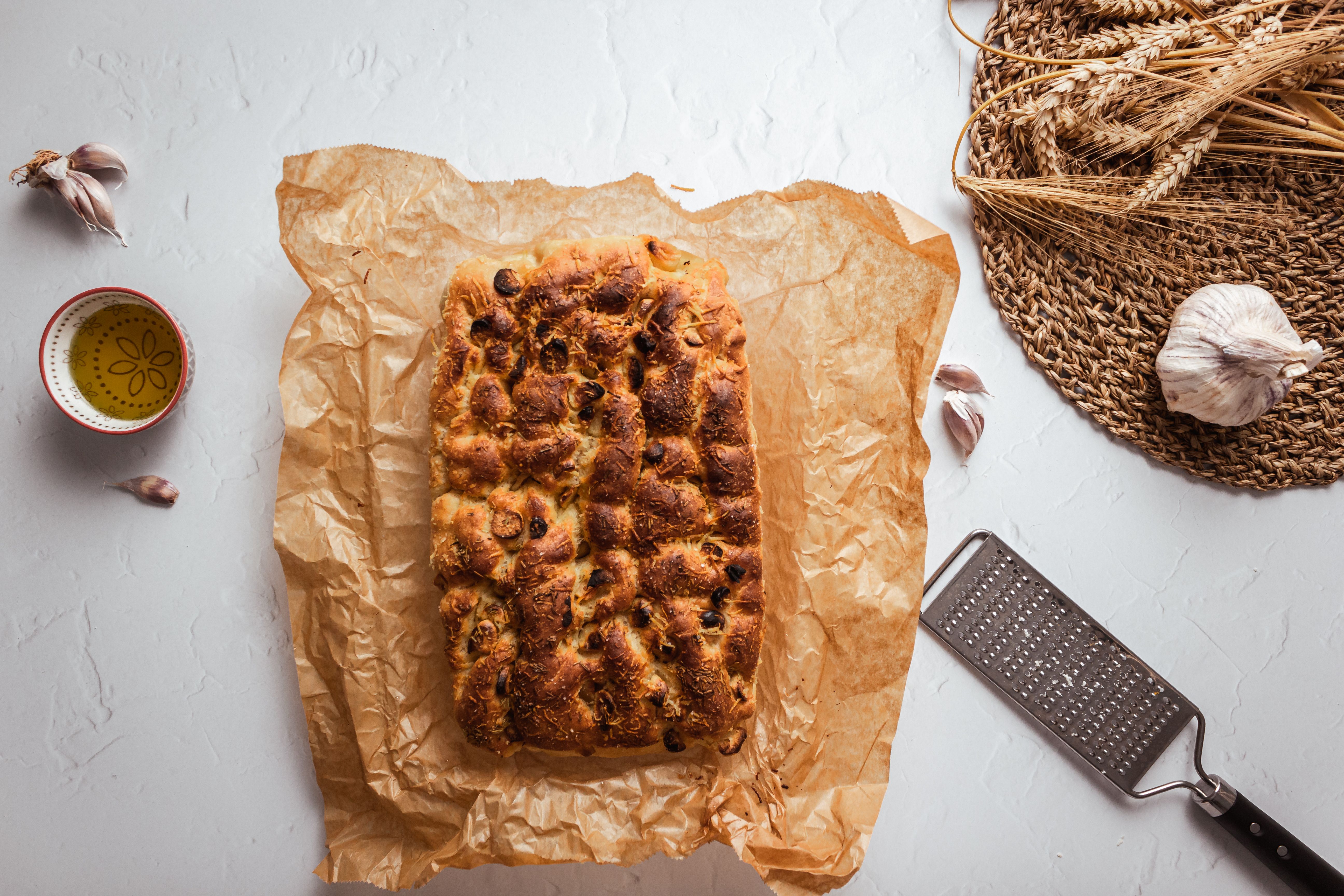 Focaccia on Paper in Overhead View · Free Stock Photo