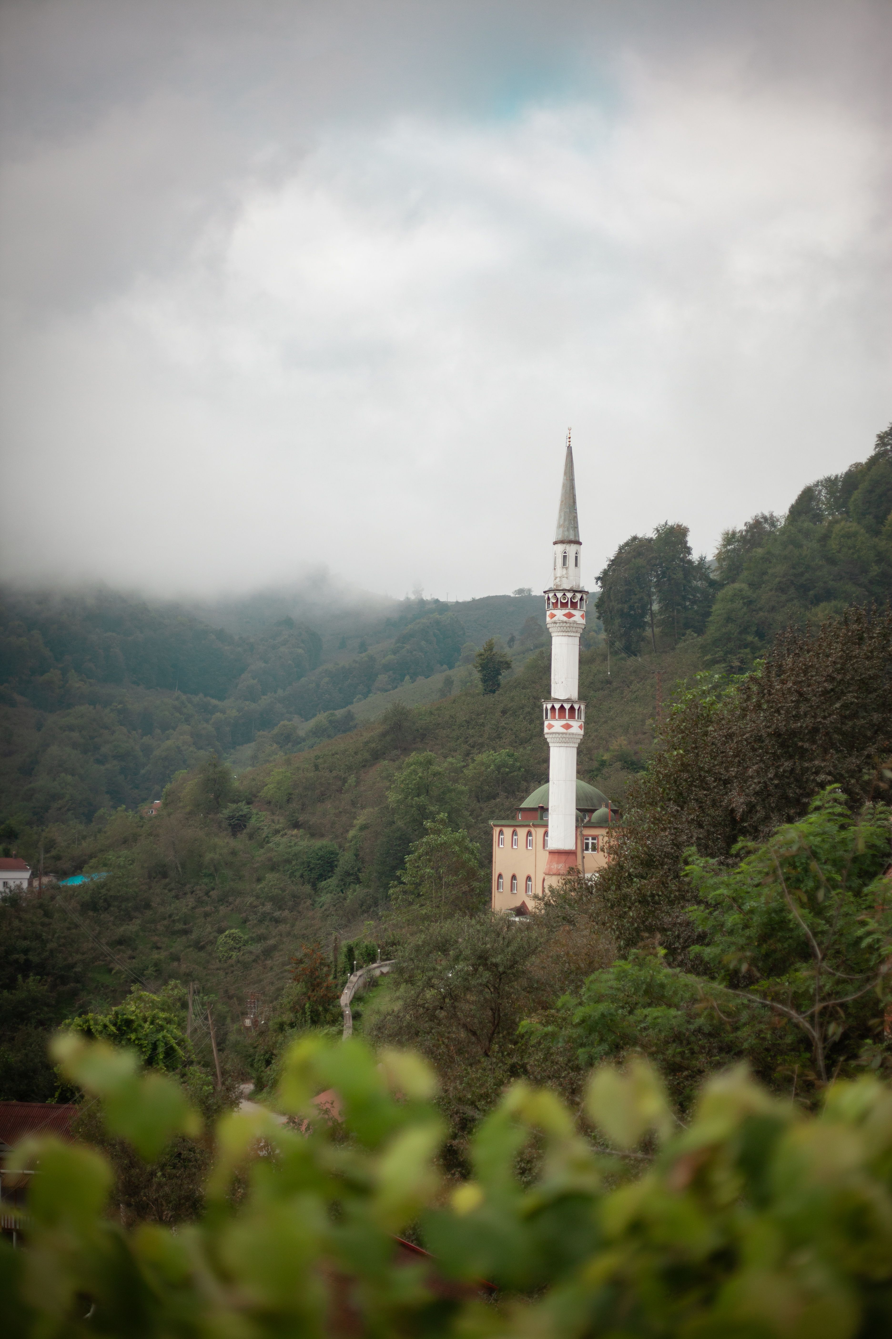 Mosque Minaret in a Forest on a Mountain Slope · Free Stock Photo