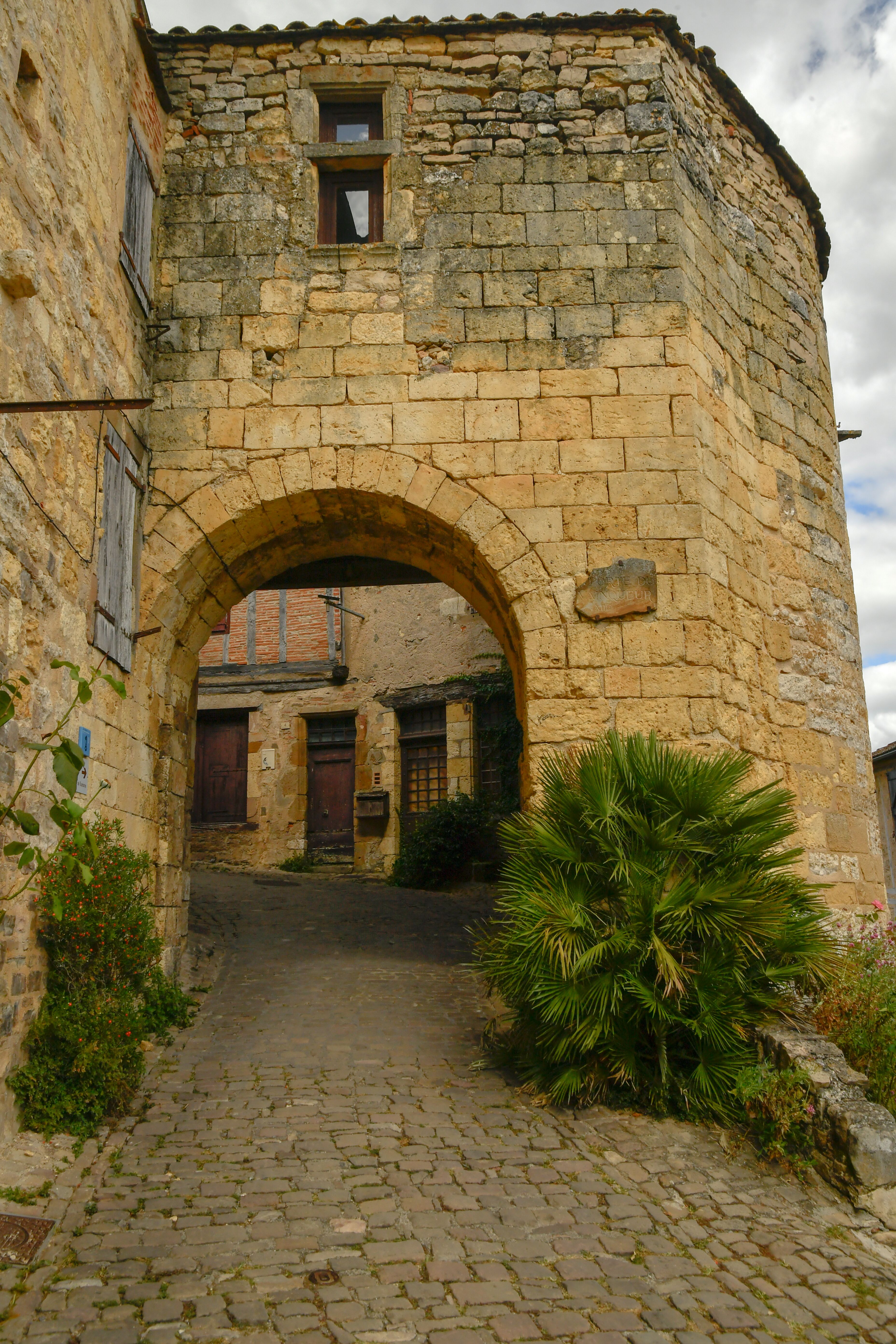 Gate under Stone Brick Building · Free Stock Photo