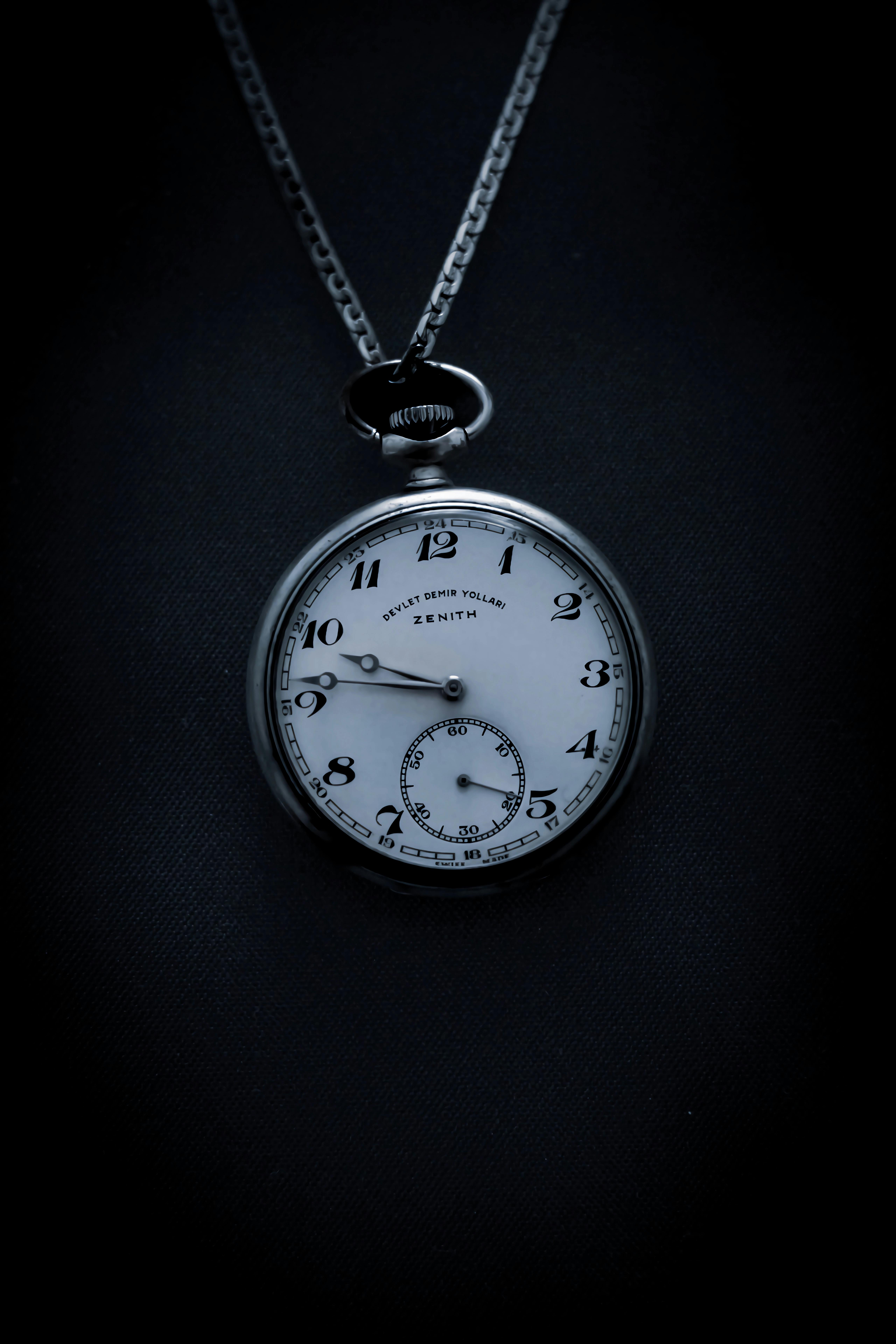 Clock on Chain · Free Stock Photo