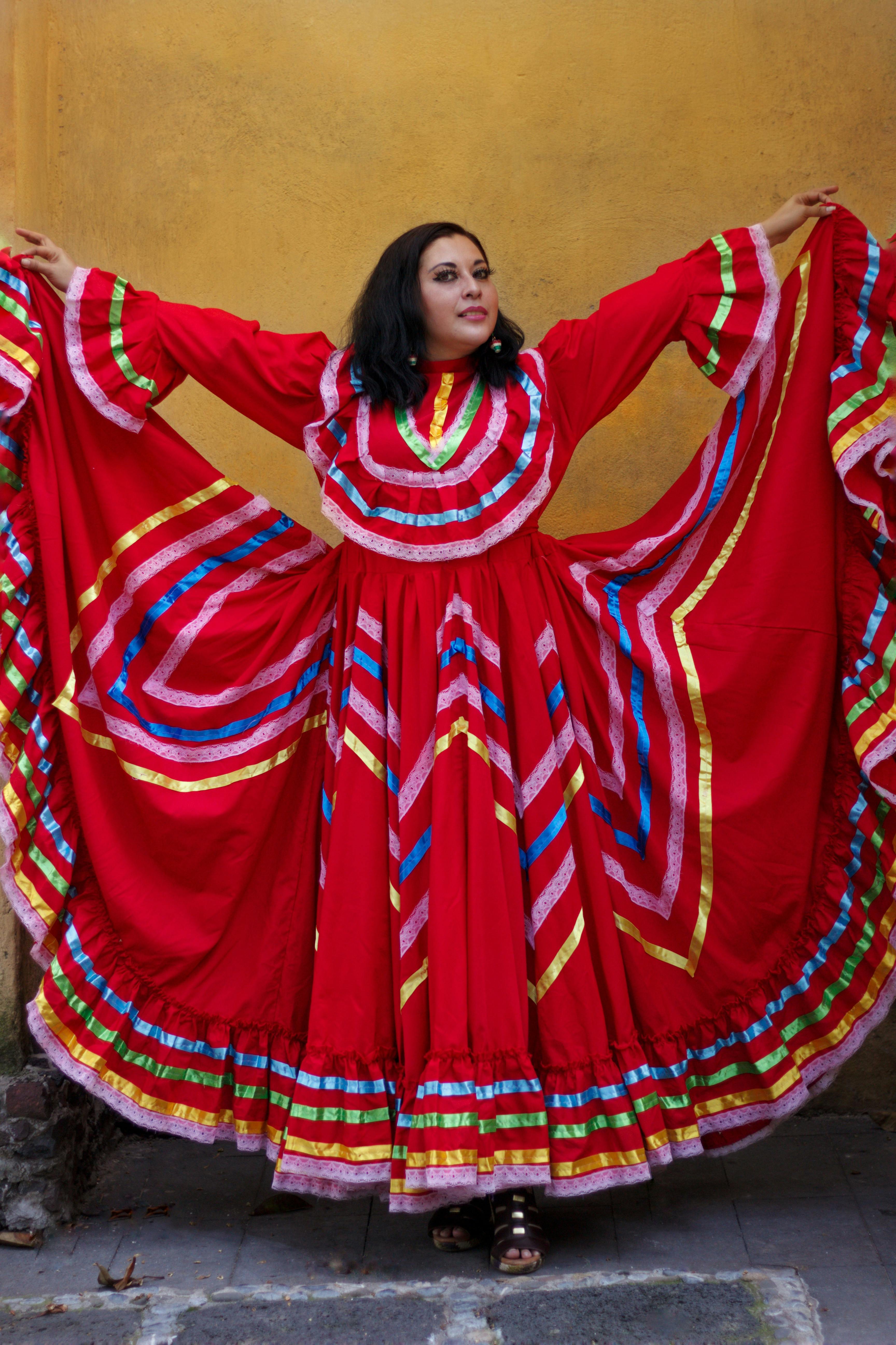 Woman Posing in Traditional, Red Dress · Free Stock Photo