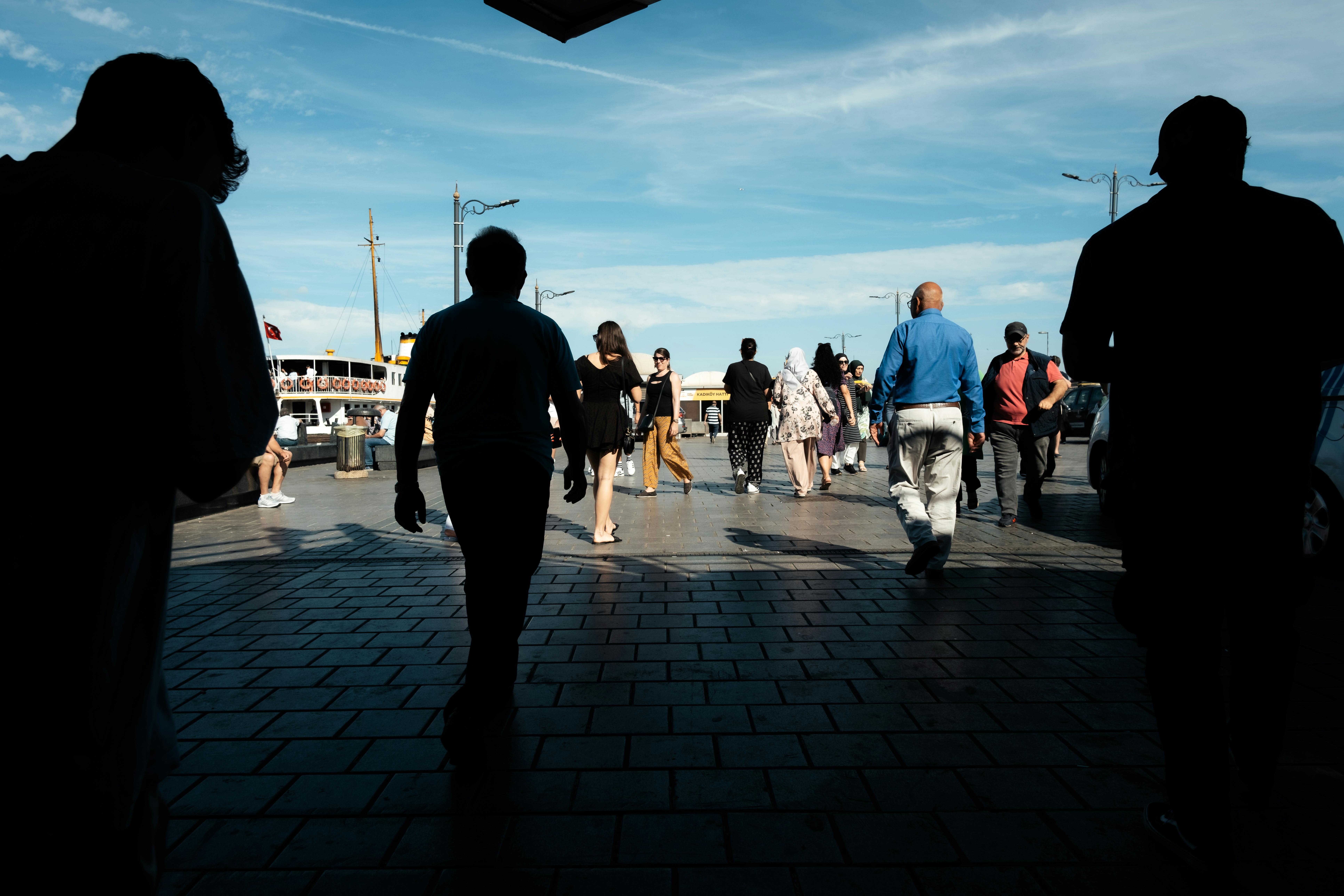 People Walking on Pavement on Coast in Istanbul · Free Stock Photo