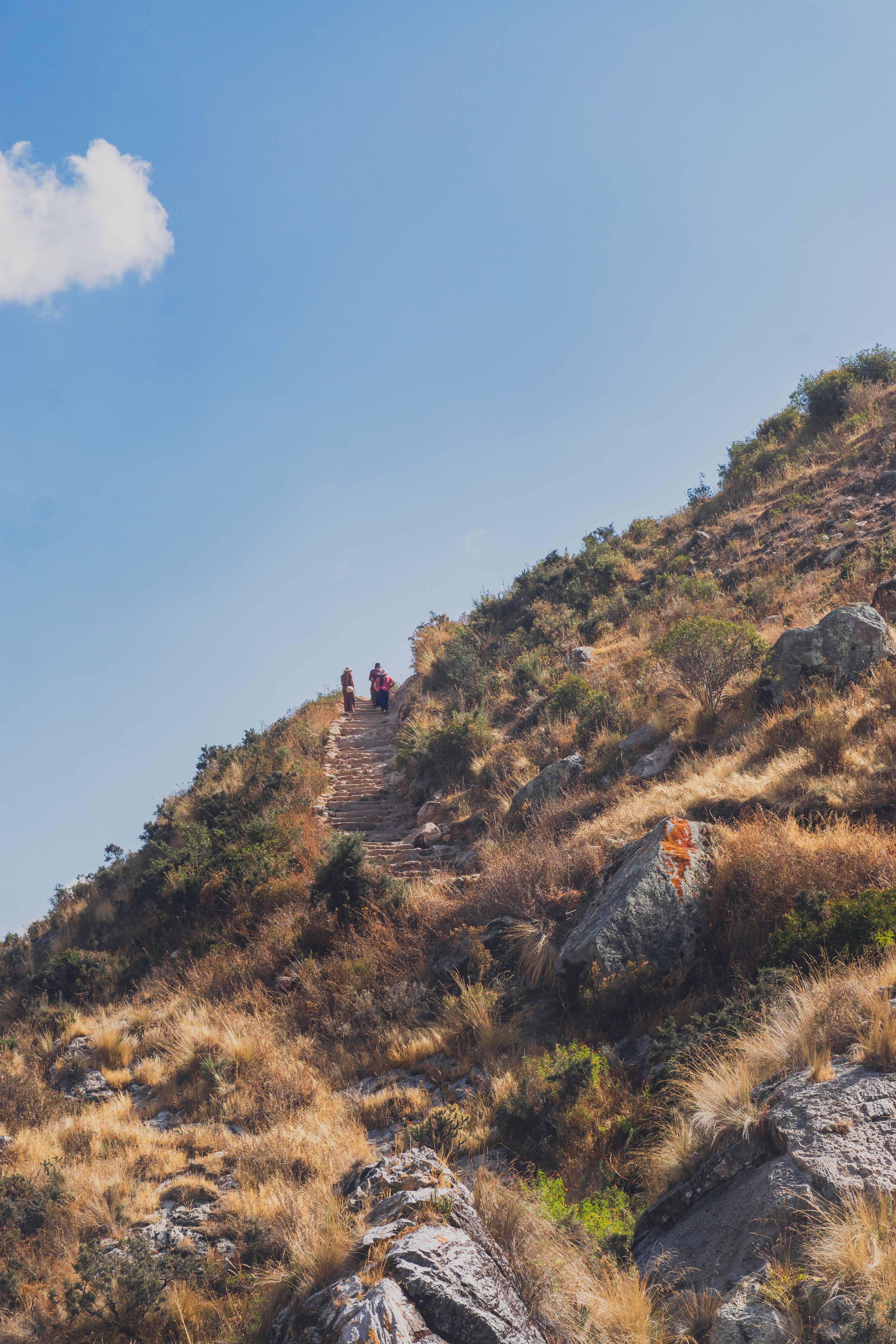Low Angle Shot of People Walking Uphill · Free Stock Photo