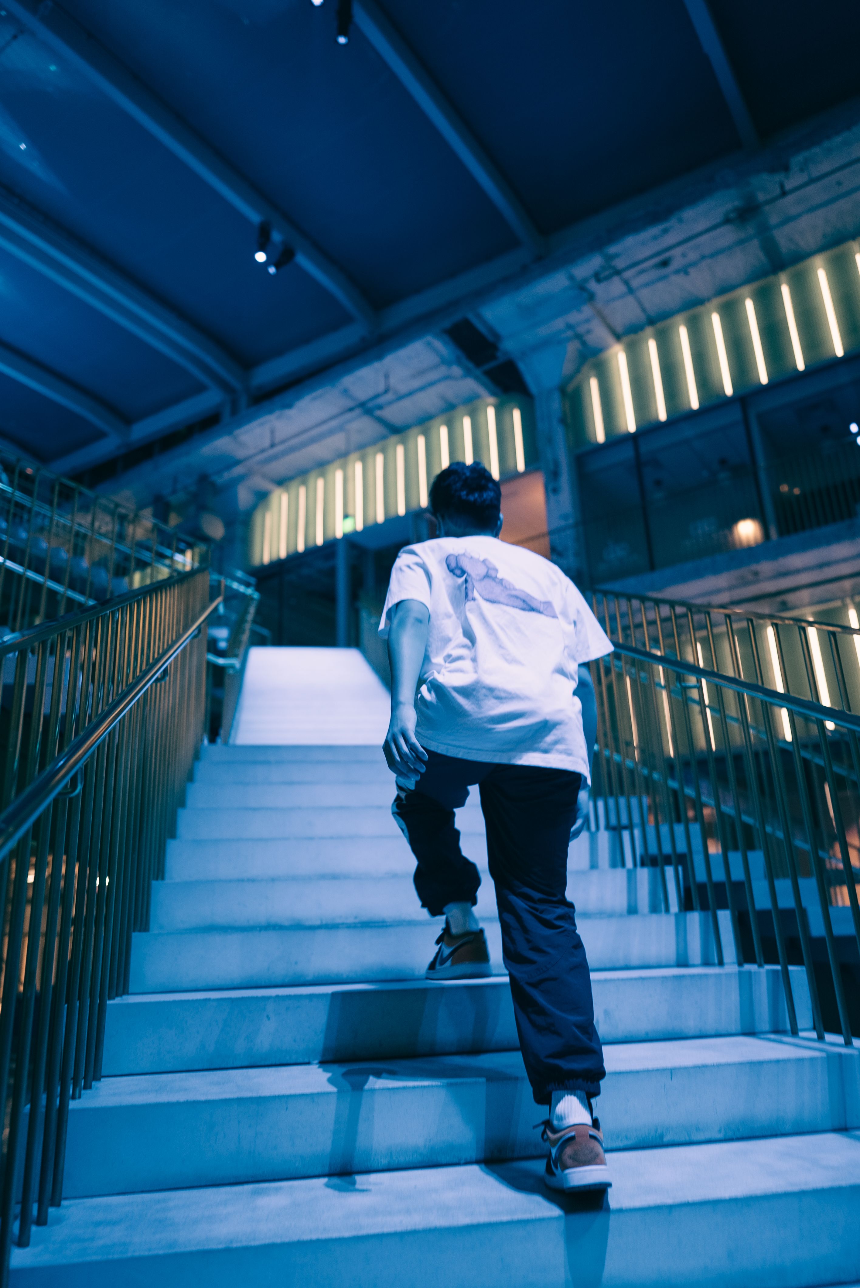 Man Walking Upstairs at Night · Free Stock Photo
