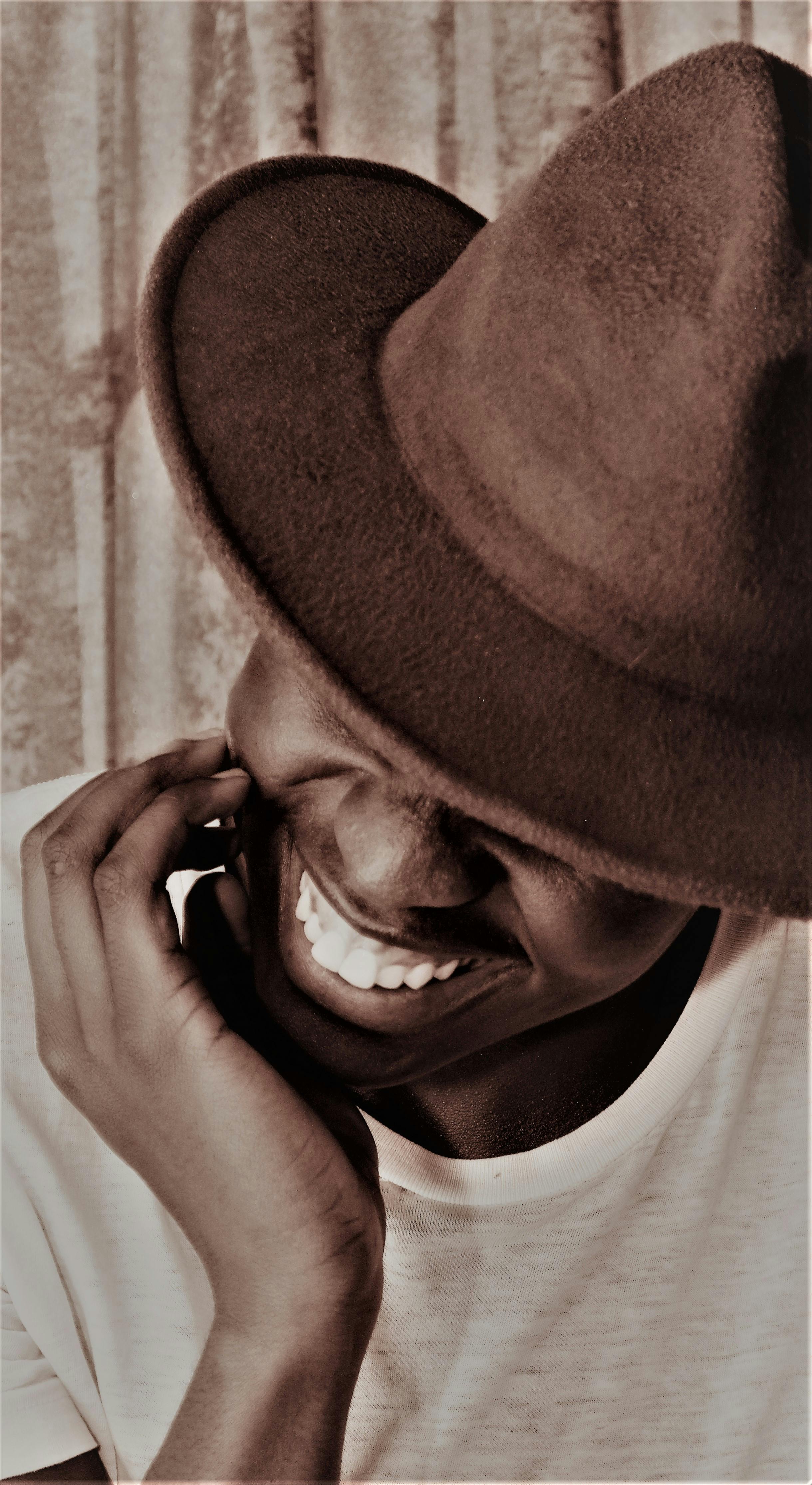 Smiling Man in Hat · Free Stock Photo