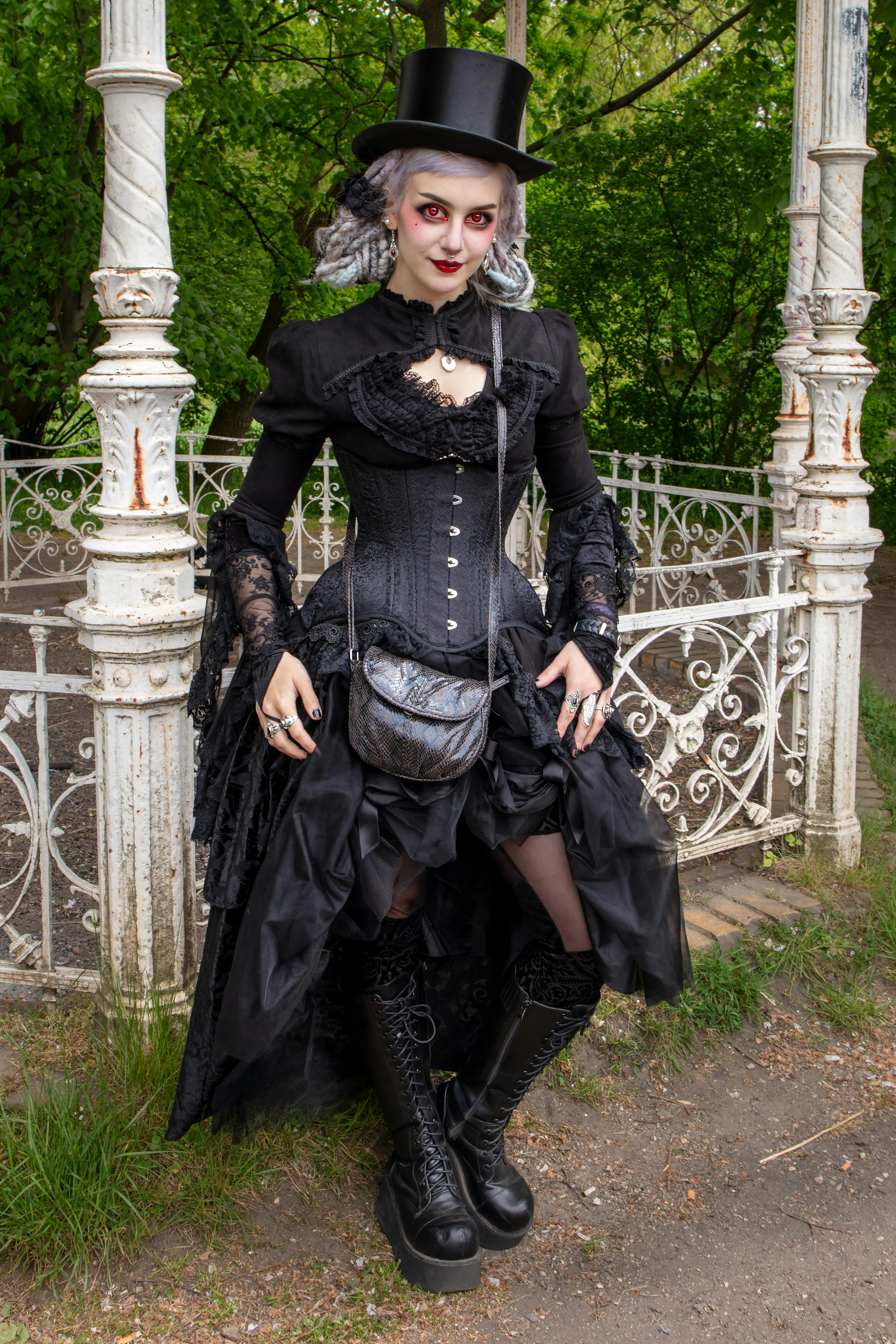 A woman in a gothic costume posing for a picture · Free Stock Photo