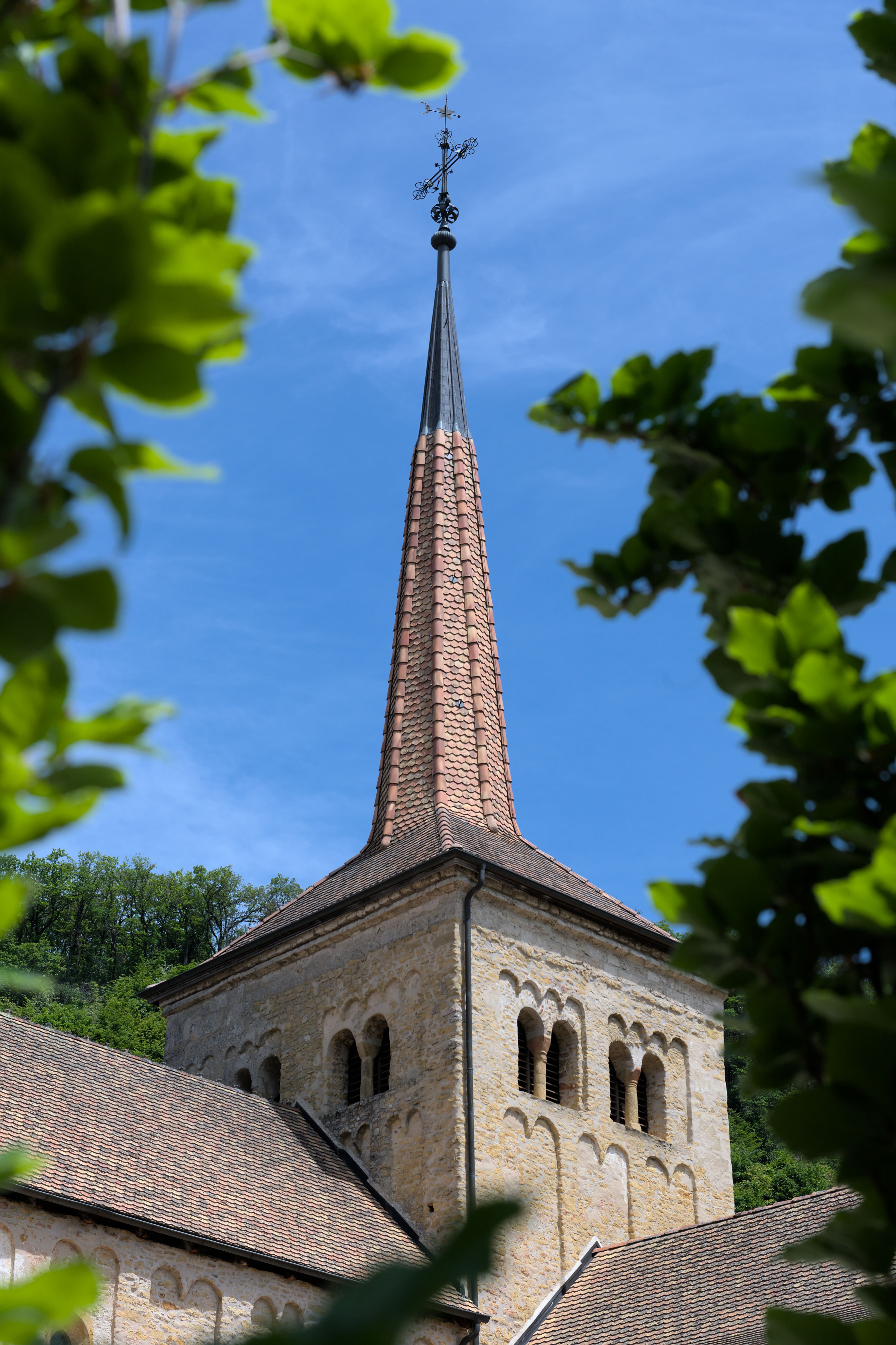Gray Concrete Church Under White Clouds and Blue Sky · Free Stock Photo