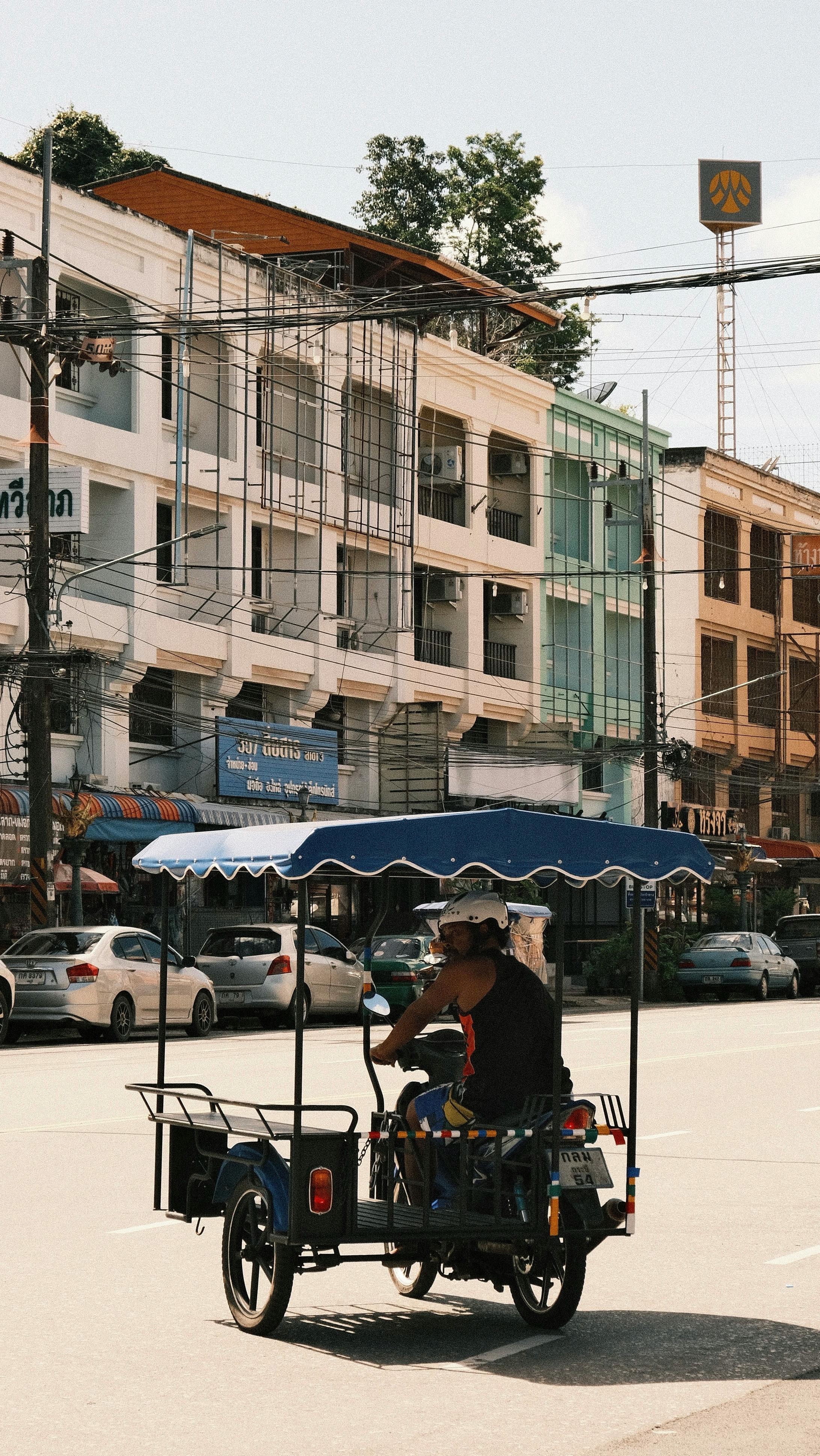 Man Riding a Motorcycle Rickshaw · Free Stock Photo