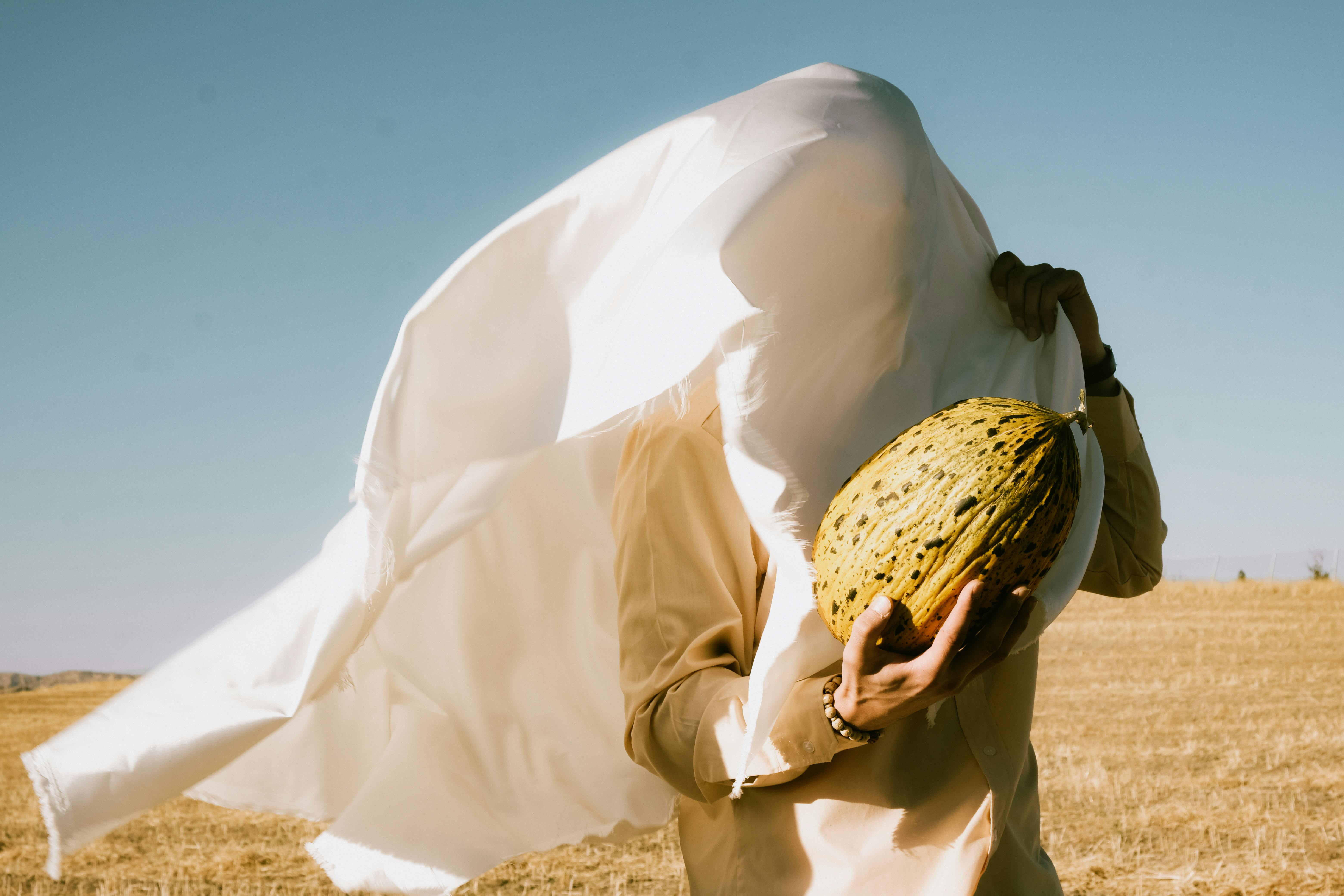 Man Carrying Melon · Free Stock Photo