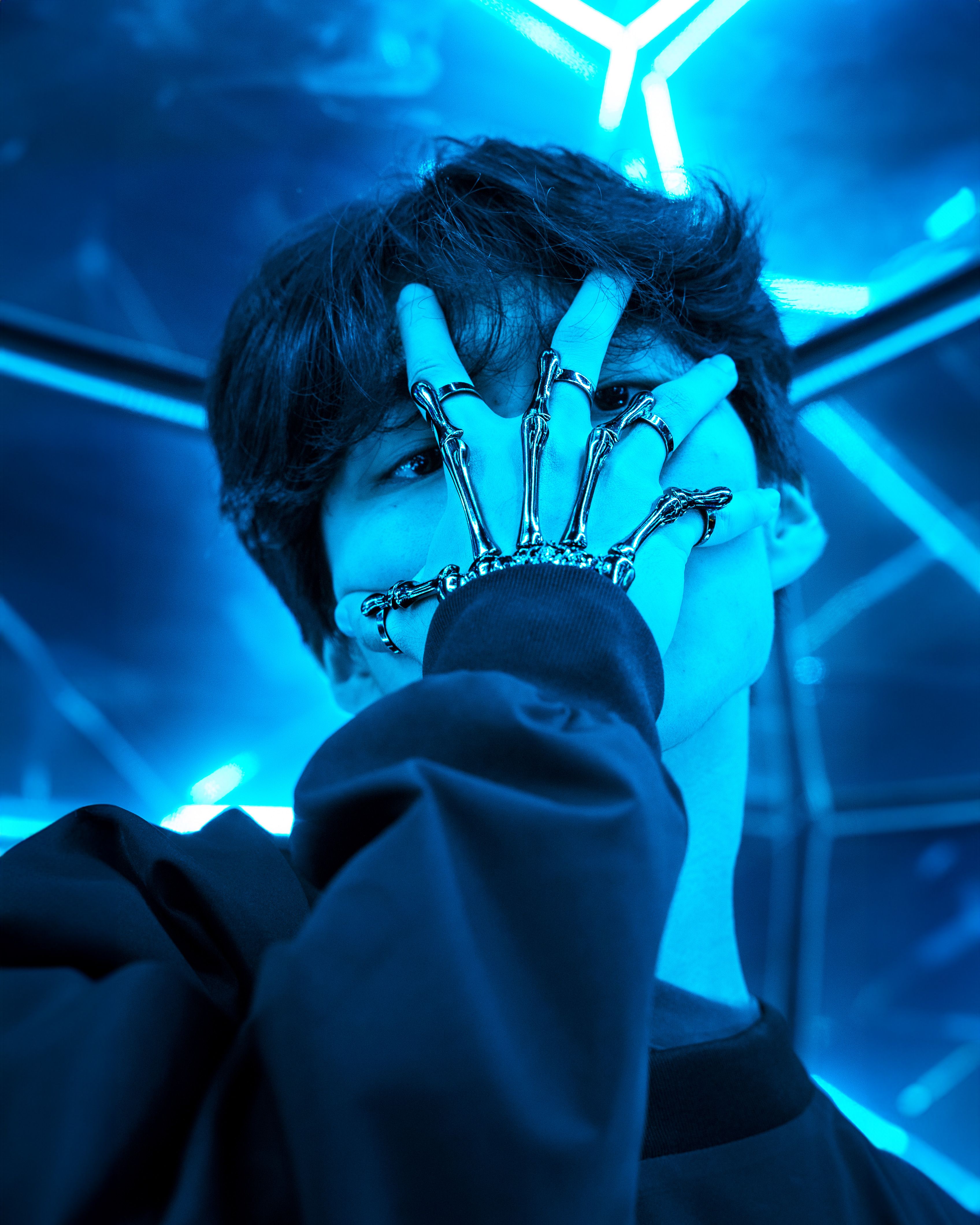 Portrait of a Young Man Wearing a Skeleton Hand shaped Jewelry · Free ...