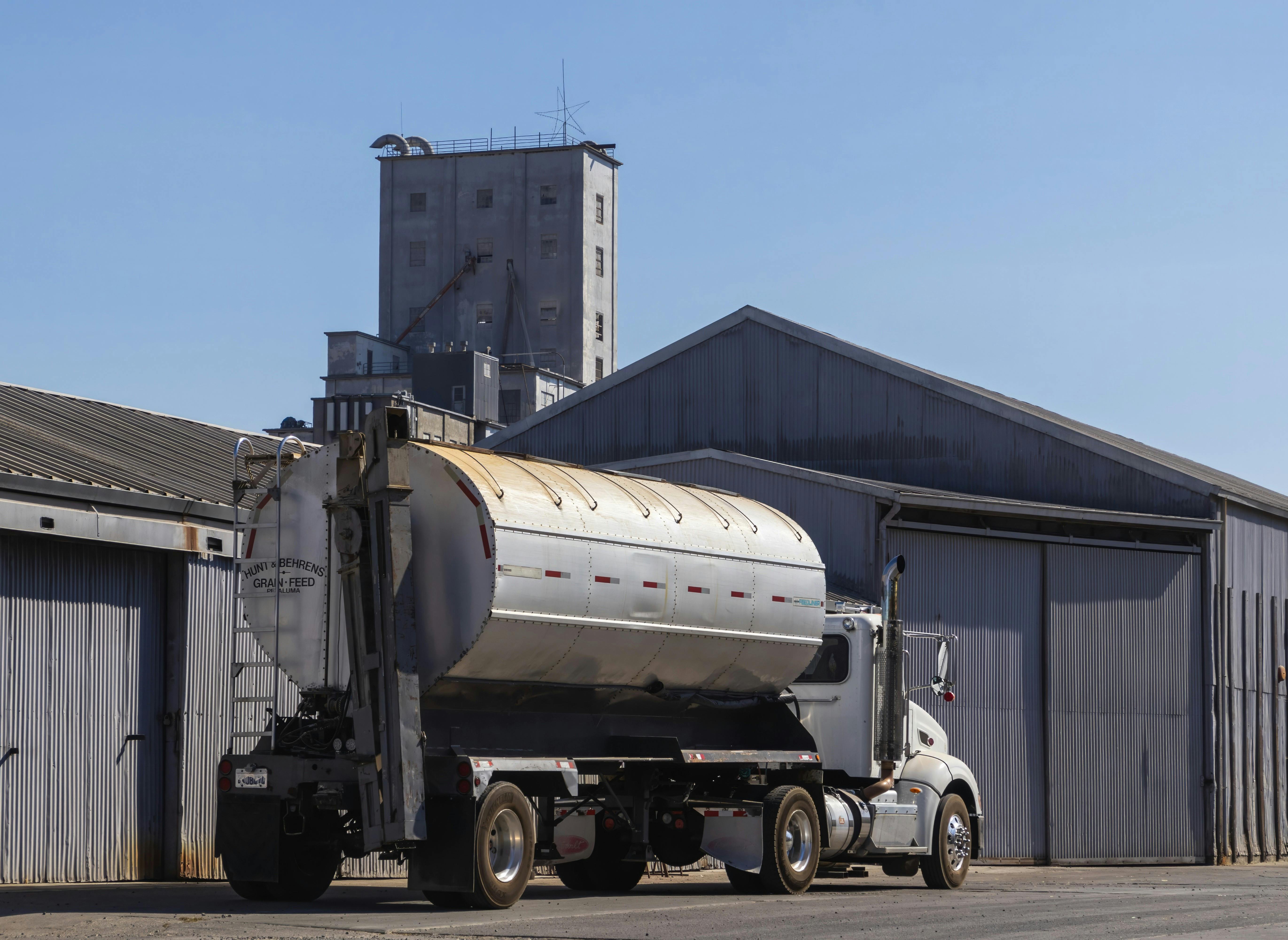 Tanker for Transporting Grain Feed in Front of Warehouses · Free Stock ...