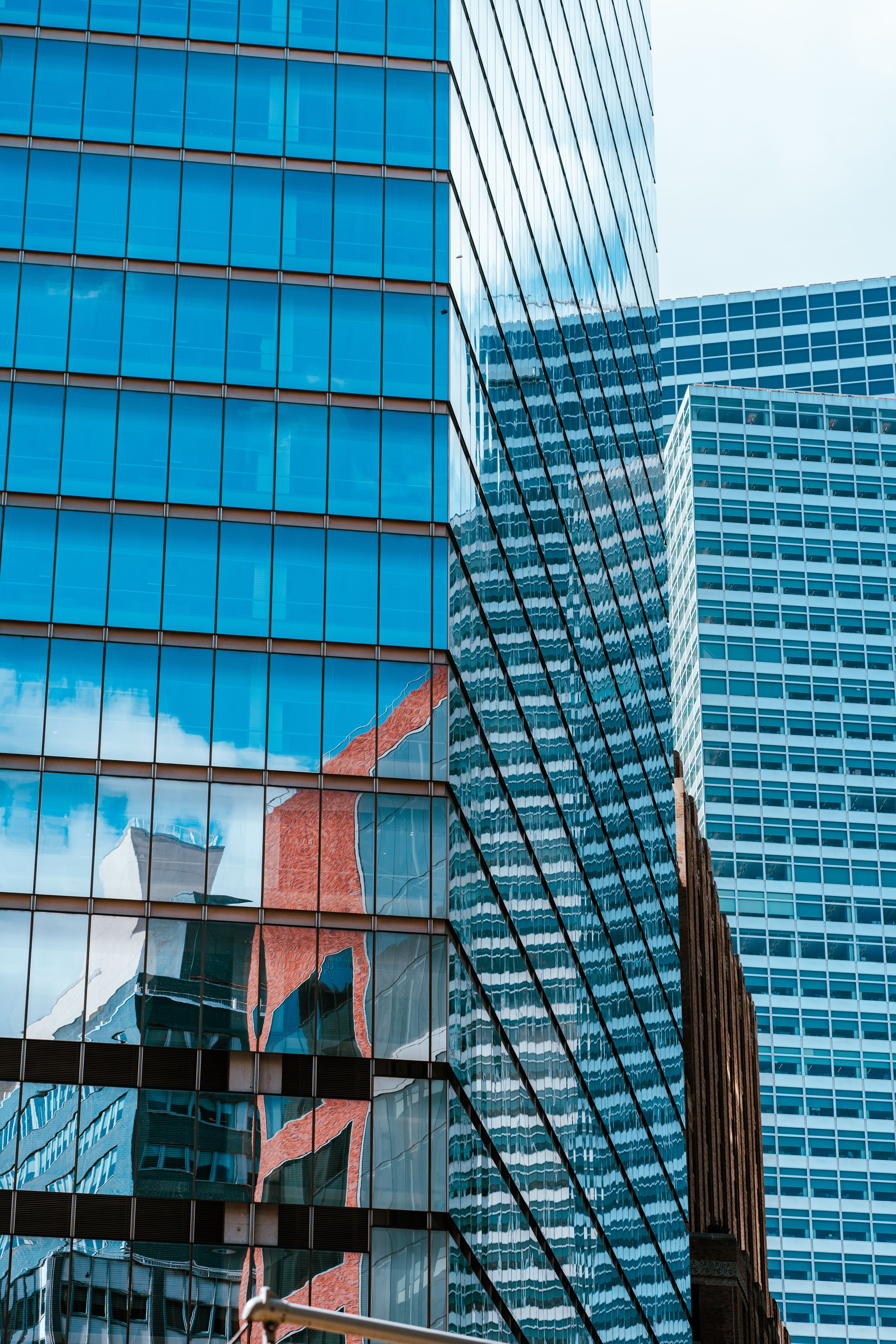 Modern High-Rise Buildings with Reflecting Walls · Free Stock Photo