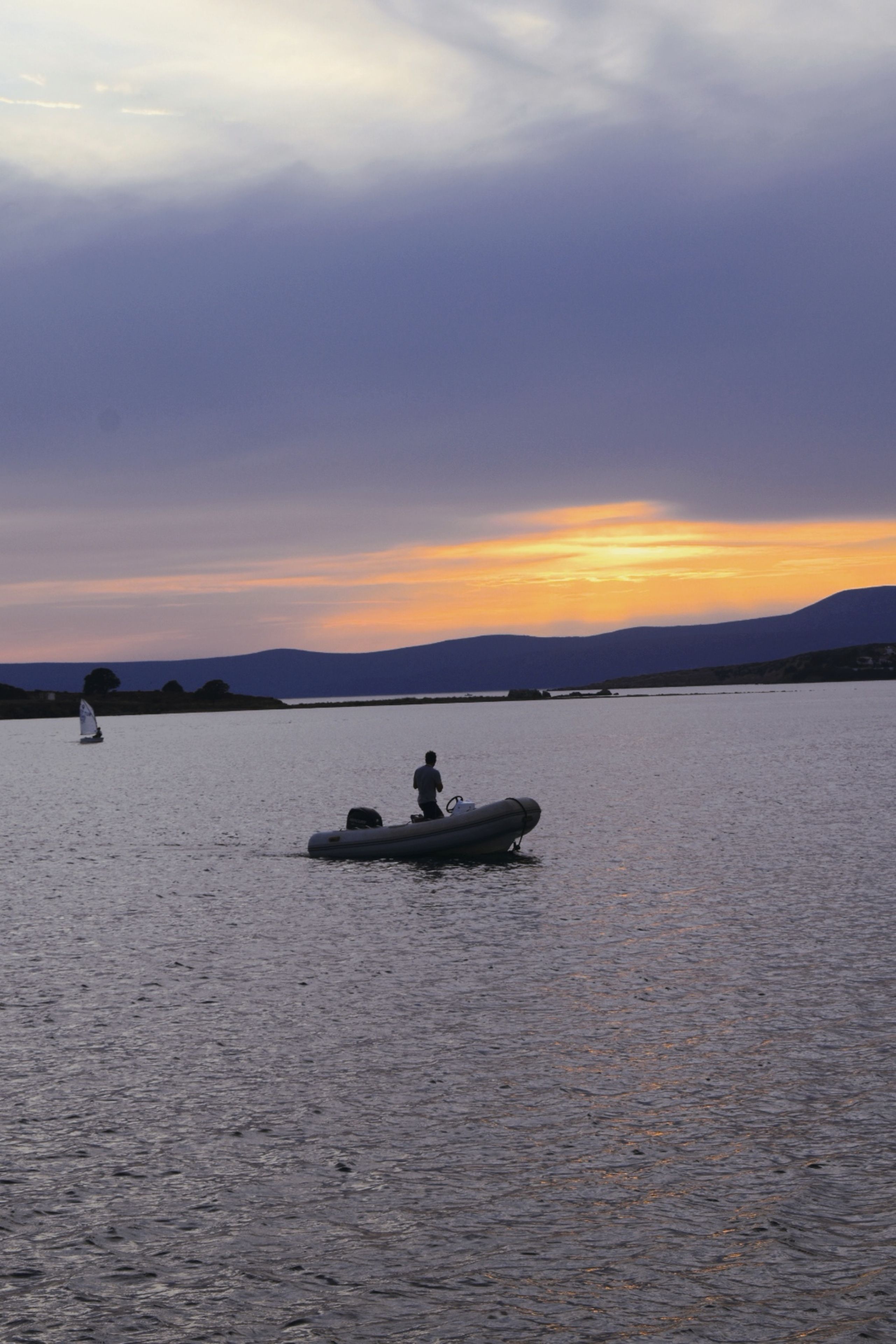 Motorboat on Lake with Hills behind · Free Stock Photo