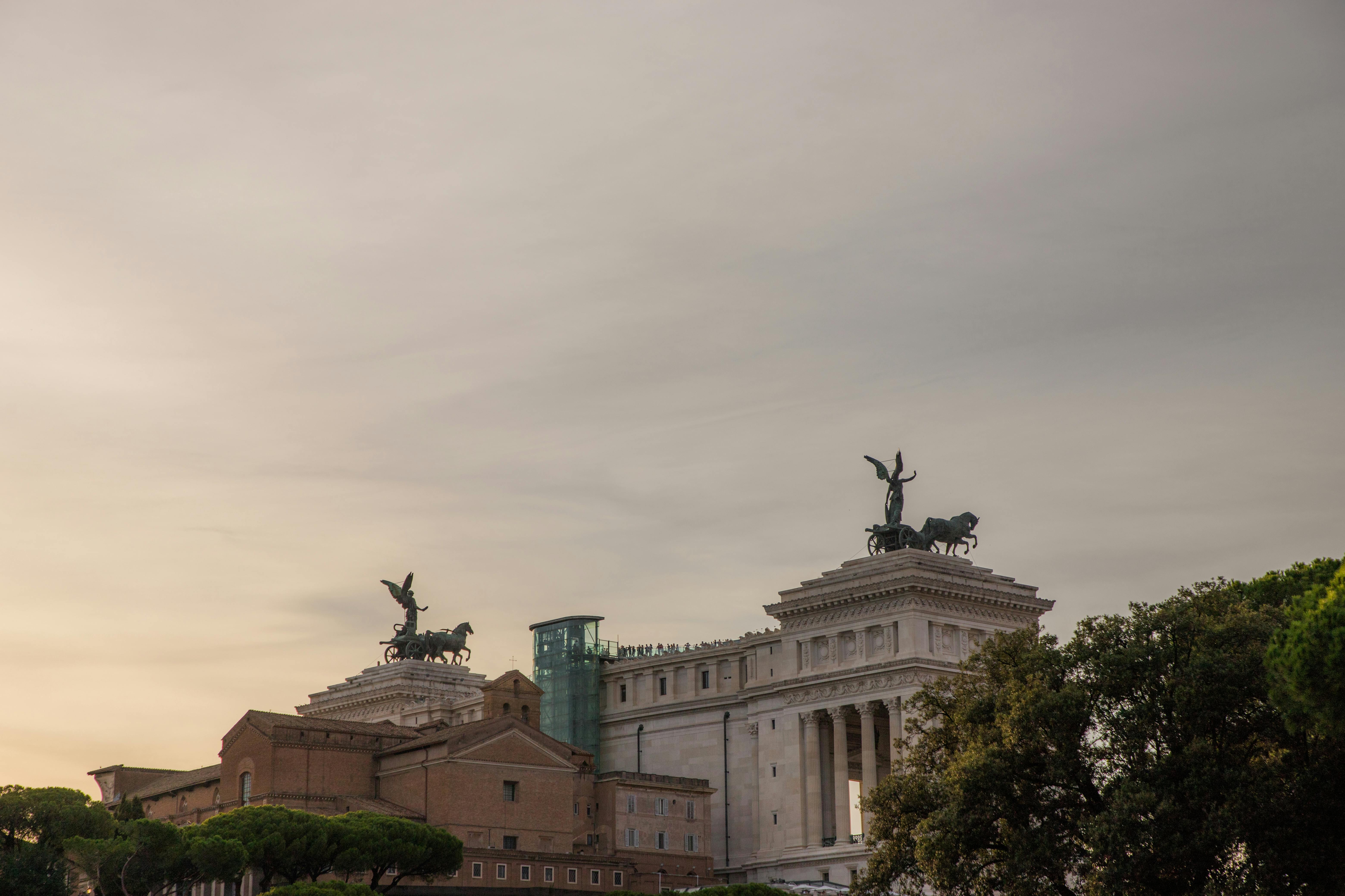 Bronze Quadriga Statues on the Monument to Victor Emmanuel II at Sunset ...