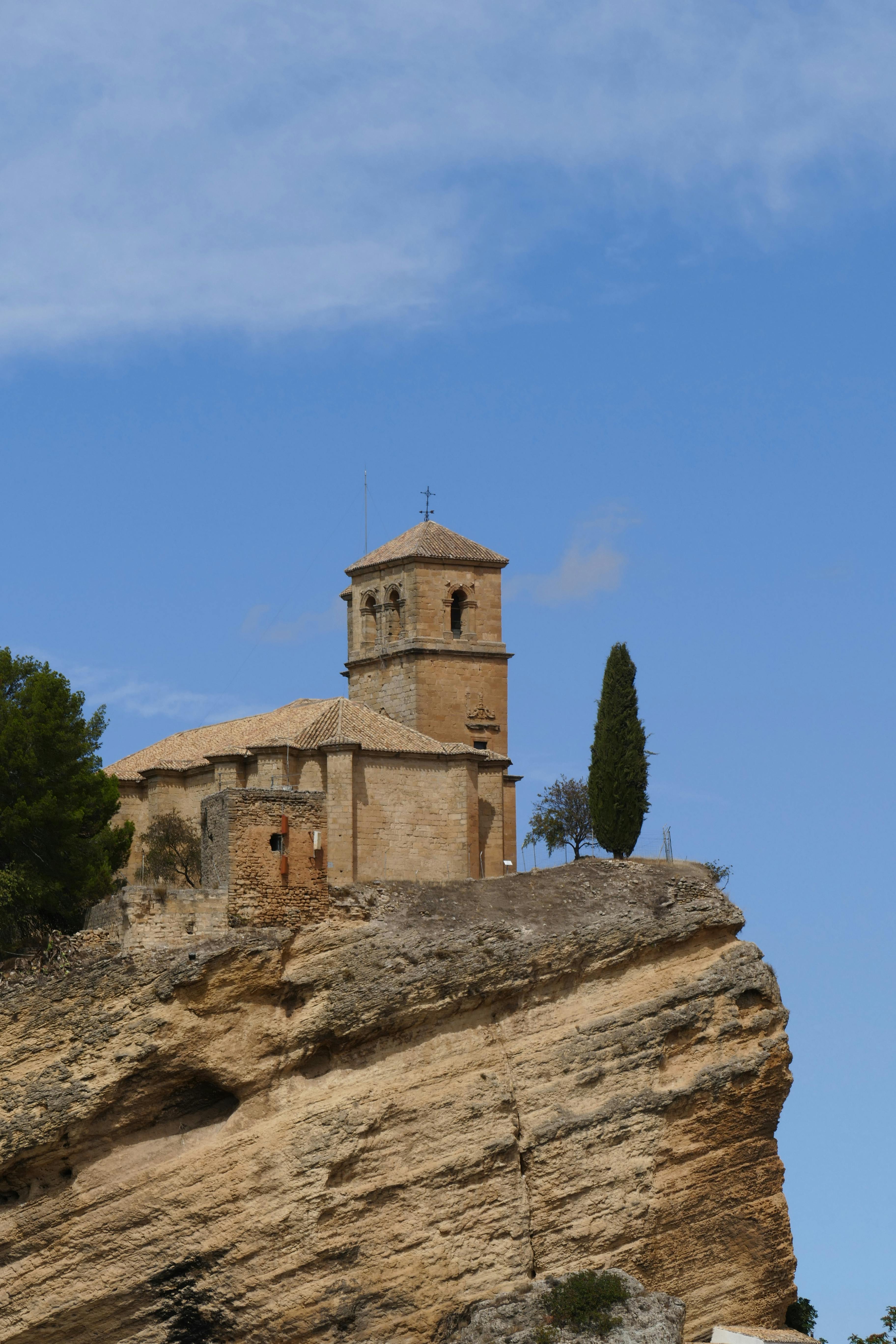 Vintage Church on Rock Formation in Village · Free Stock Photo