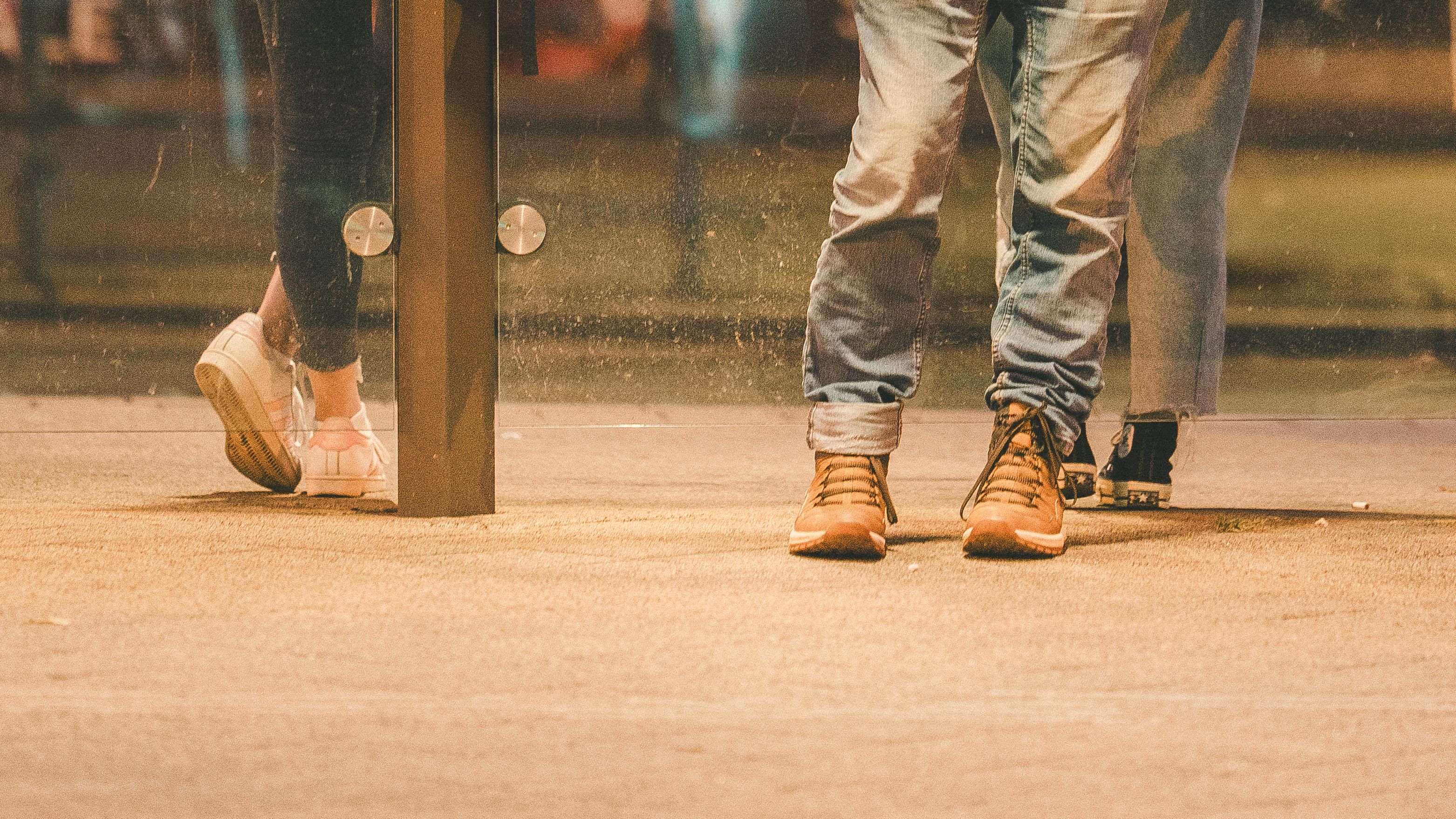 Legs of People Standing on Bus Stop · Free Stock Photo