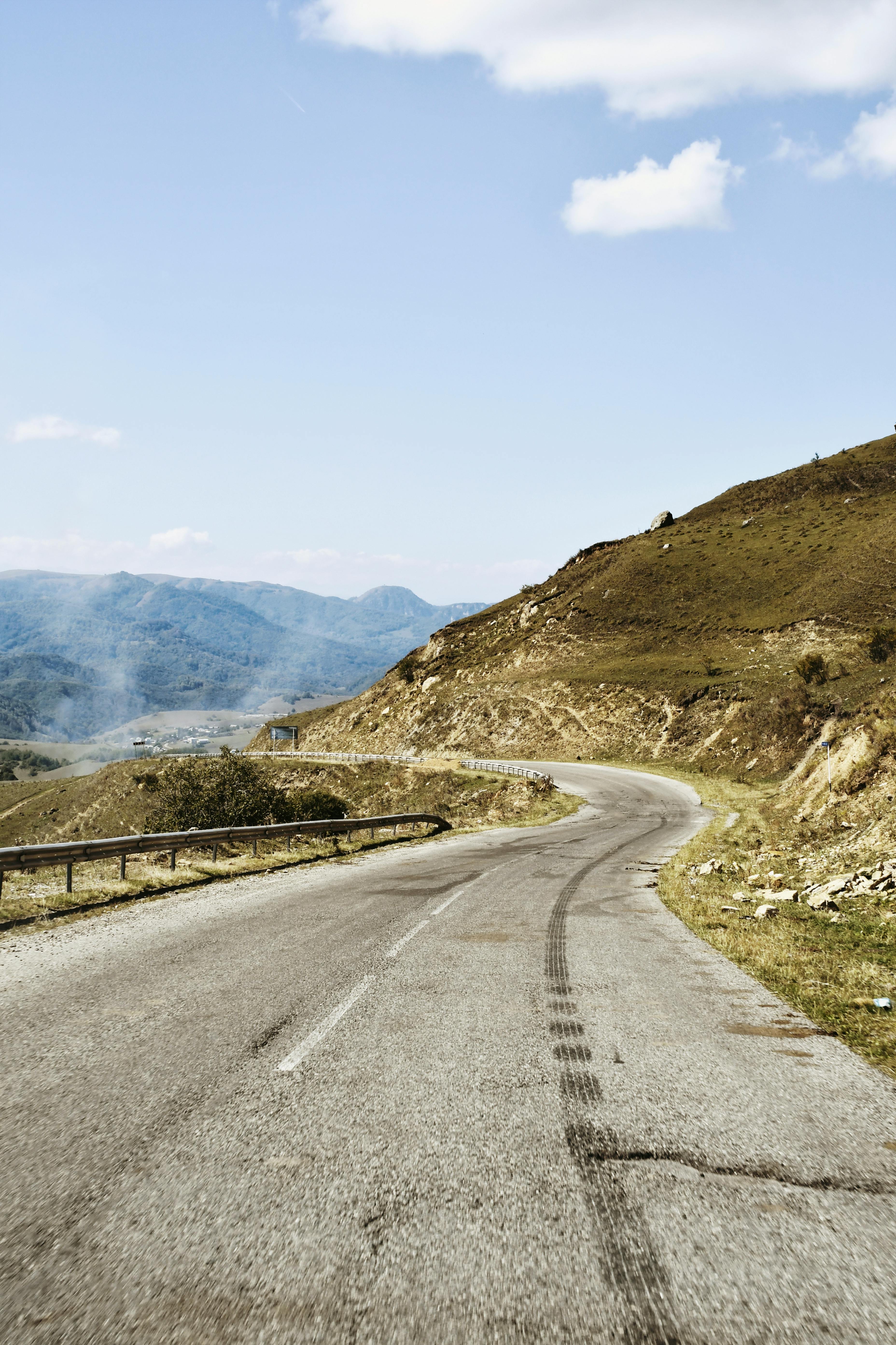 Photography of Asphalt Road Near Trees · Free Stock Photo