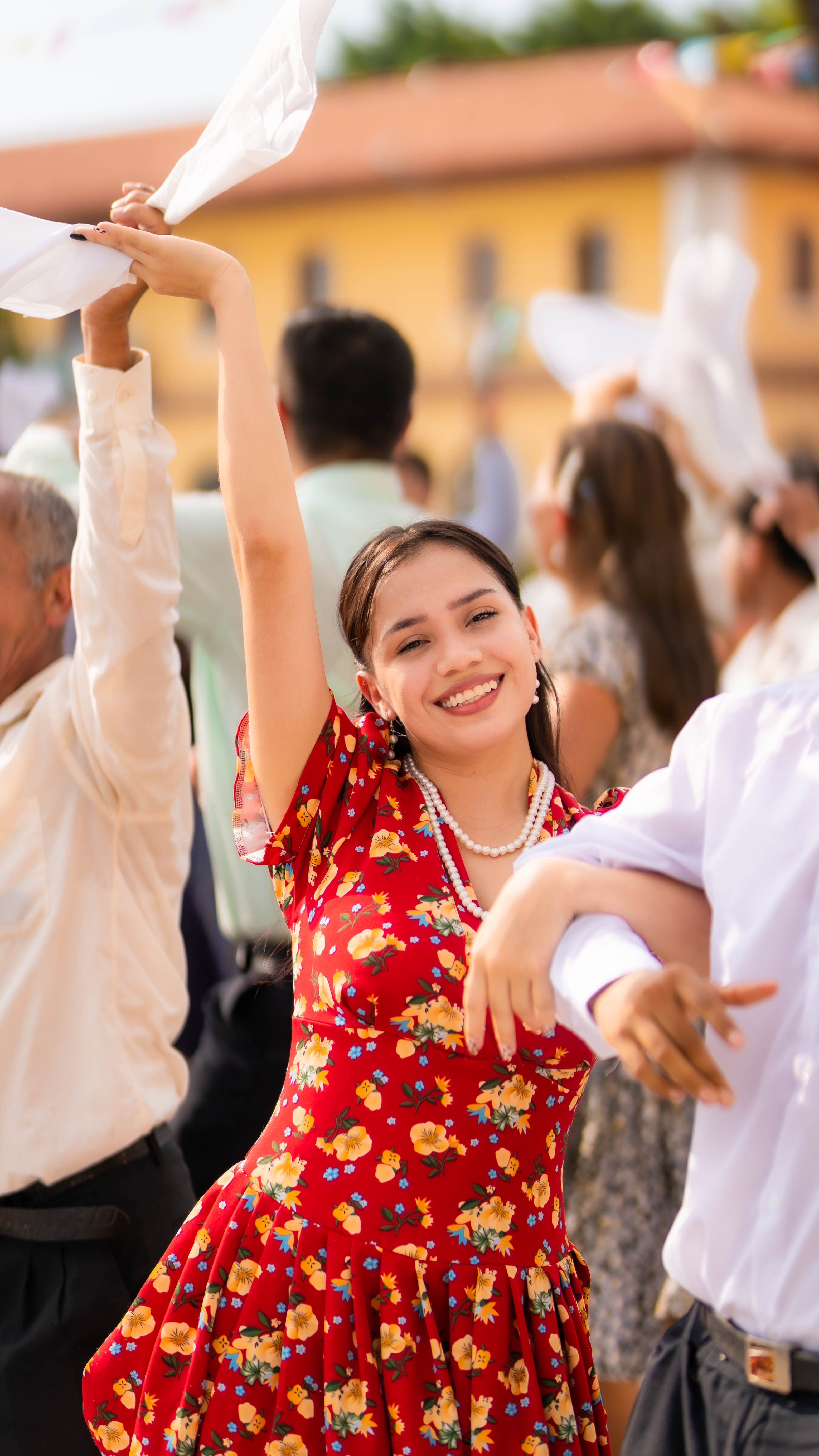 Young Woman Dancing with a Group of People in a Town Square · Free ...
