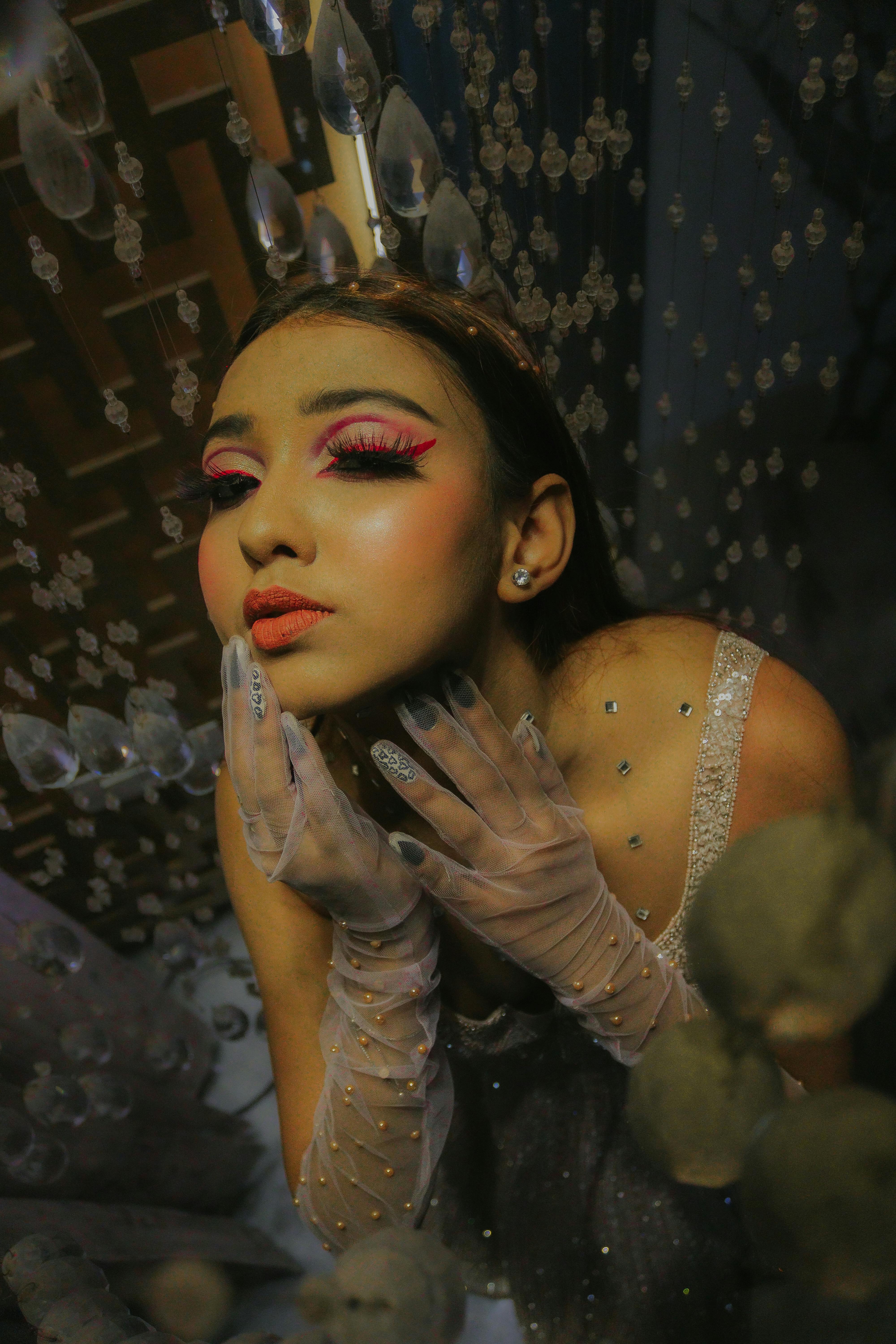 Young Woman in a Dress and Glamour Makeup Look · Free Stock Photo