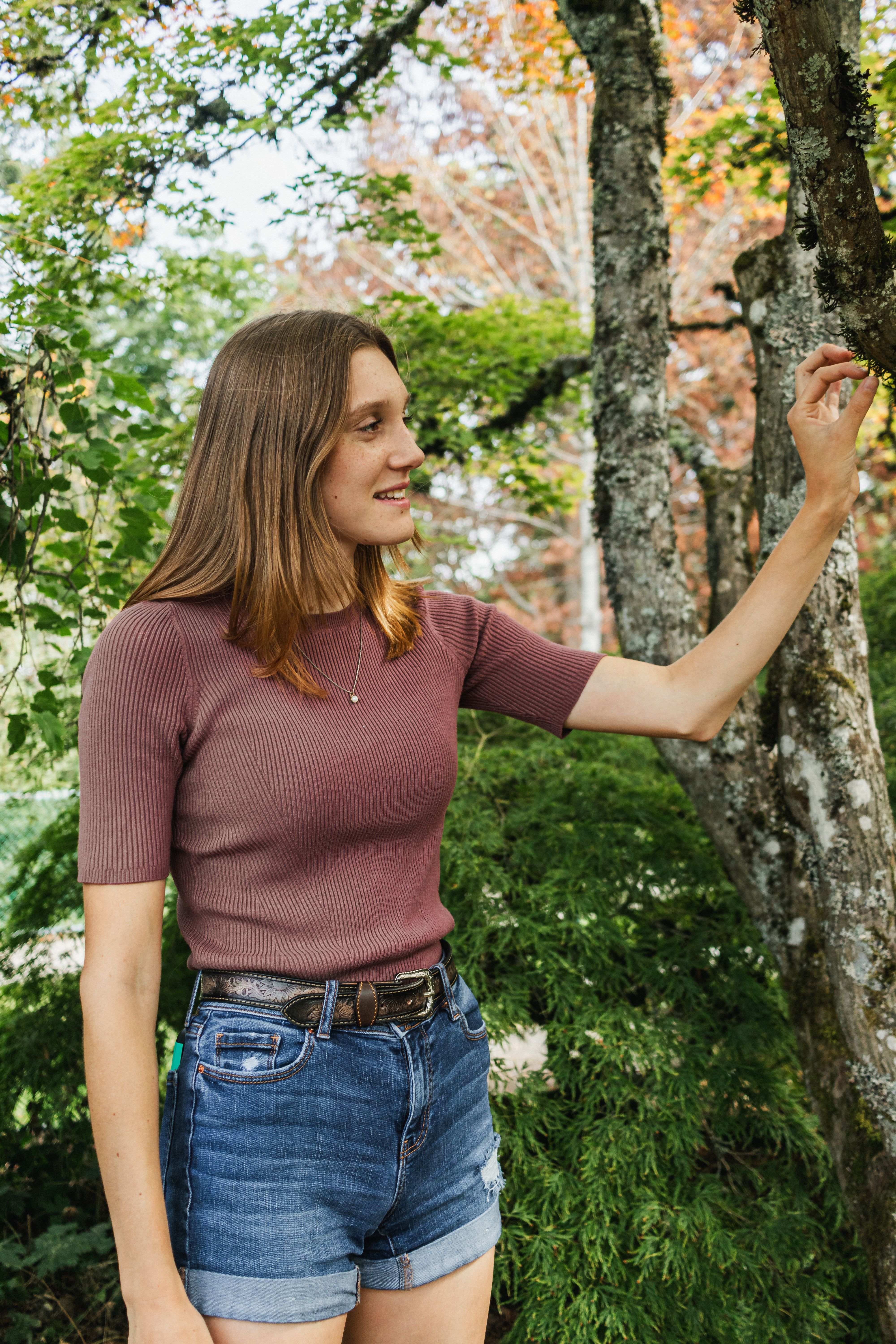 Smiling Woman among Trees · Free Stock Photo